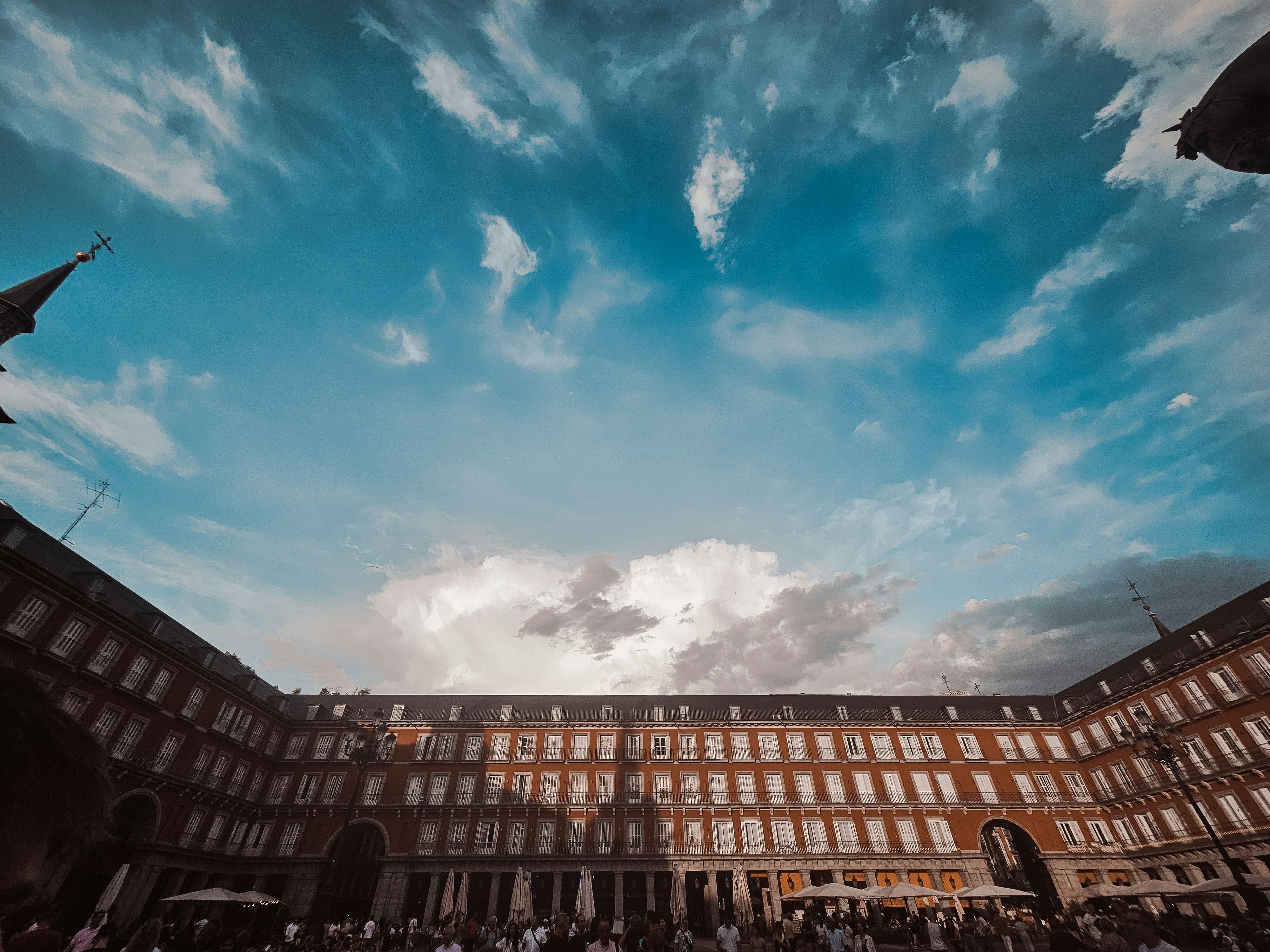 Sky Above the Cloister: A Courtyard Under a Bright Firmament
