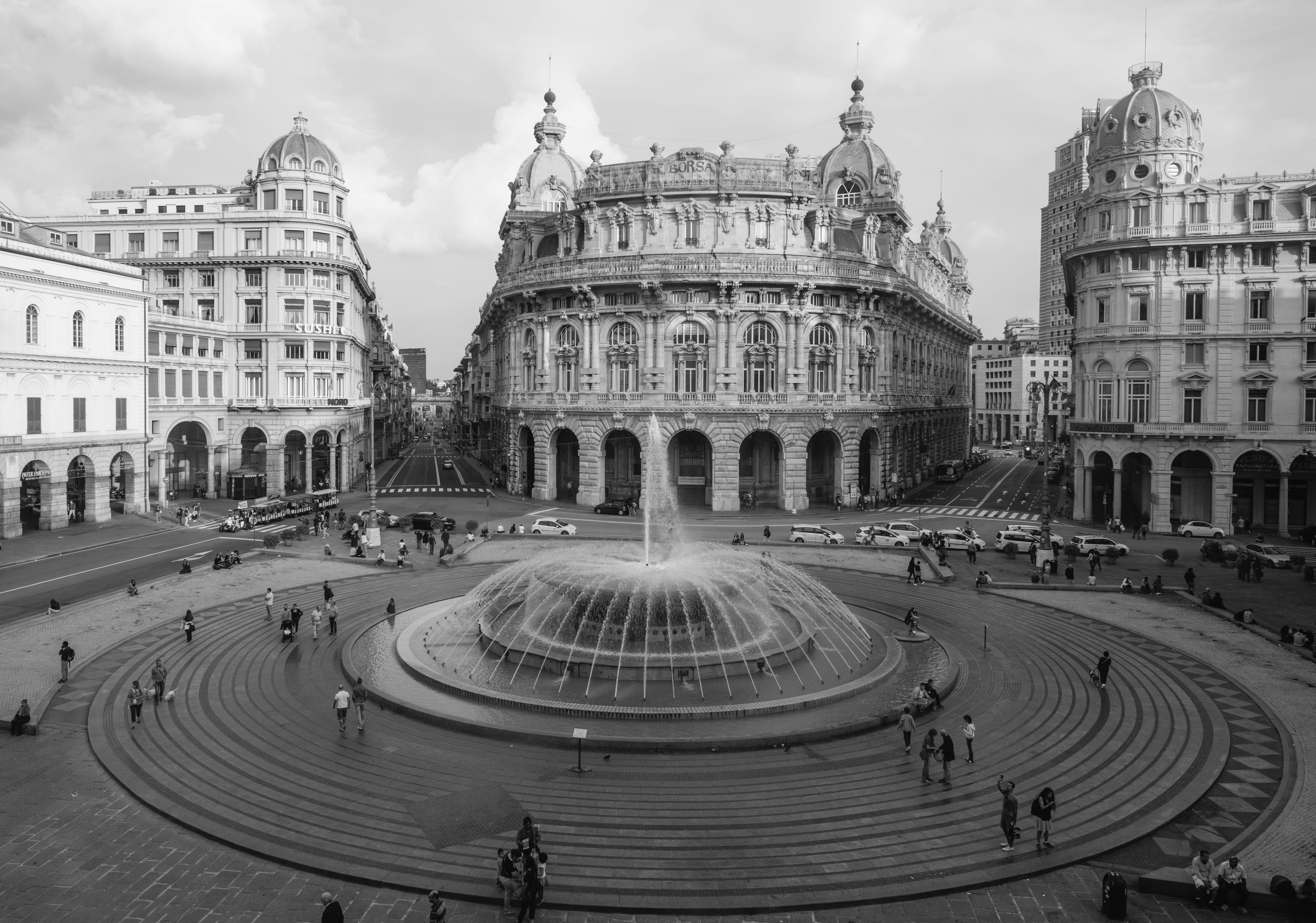 The Circular Piazza Fountain: Baroque Facades Framing a Quiet European Square
