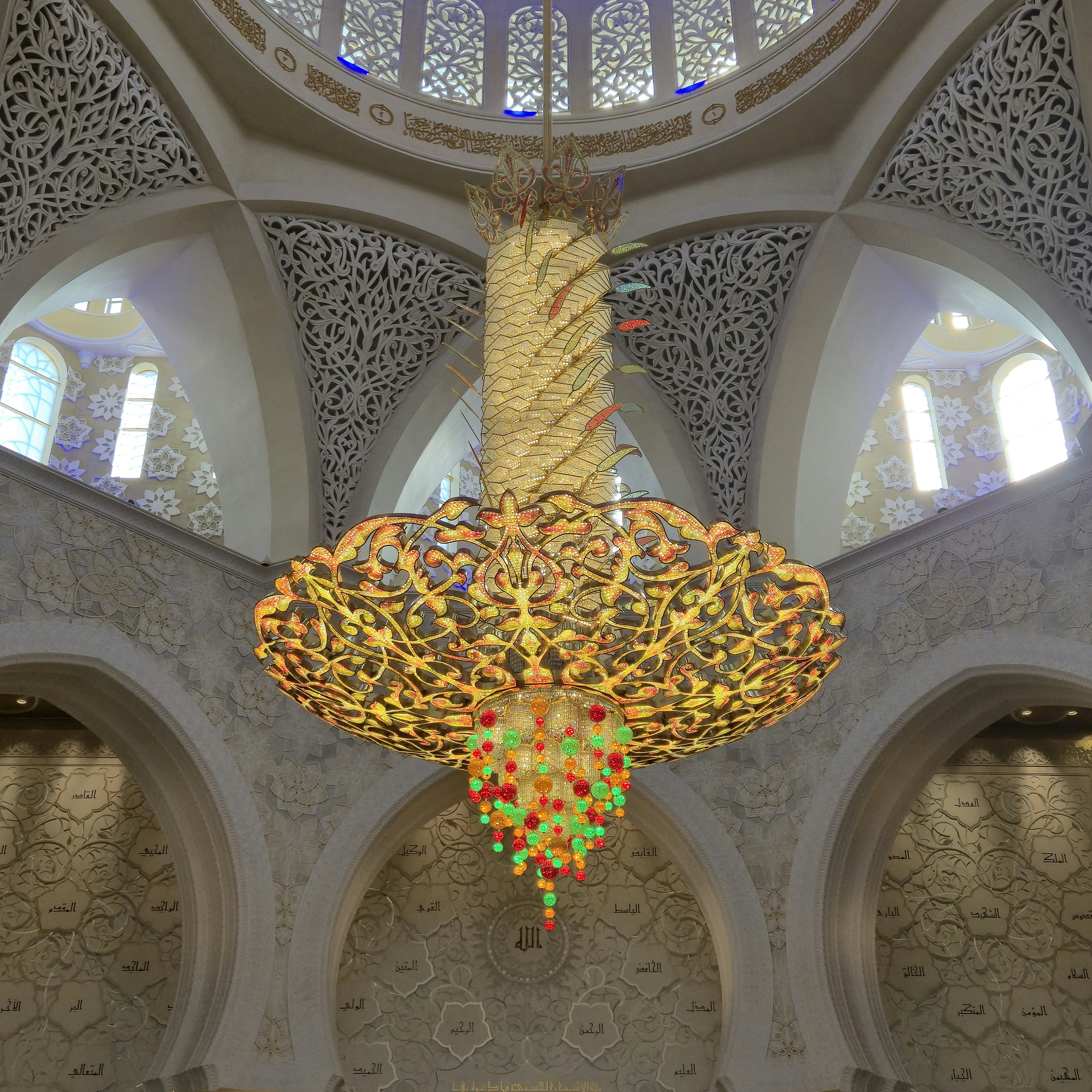Golden Lattice Crown: Chandelier Hanging in an Ornate Dome