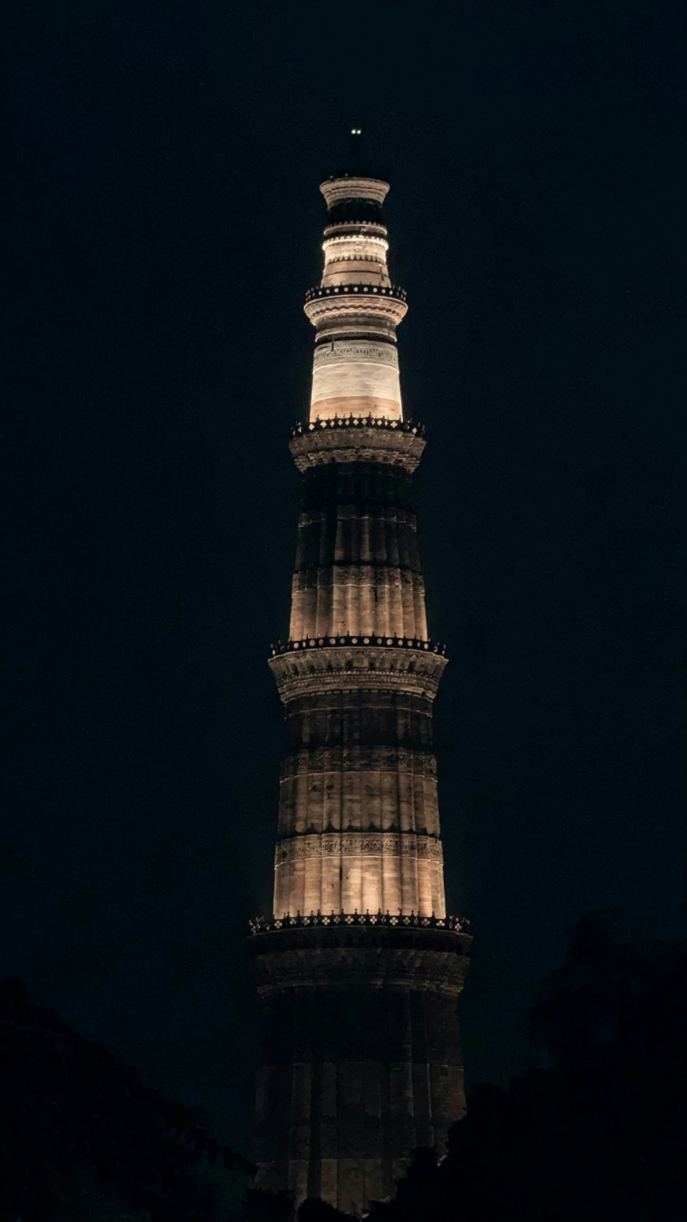Celestial Spire Under Night Drift