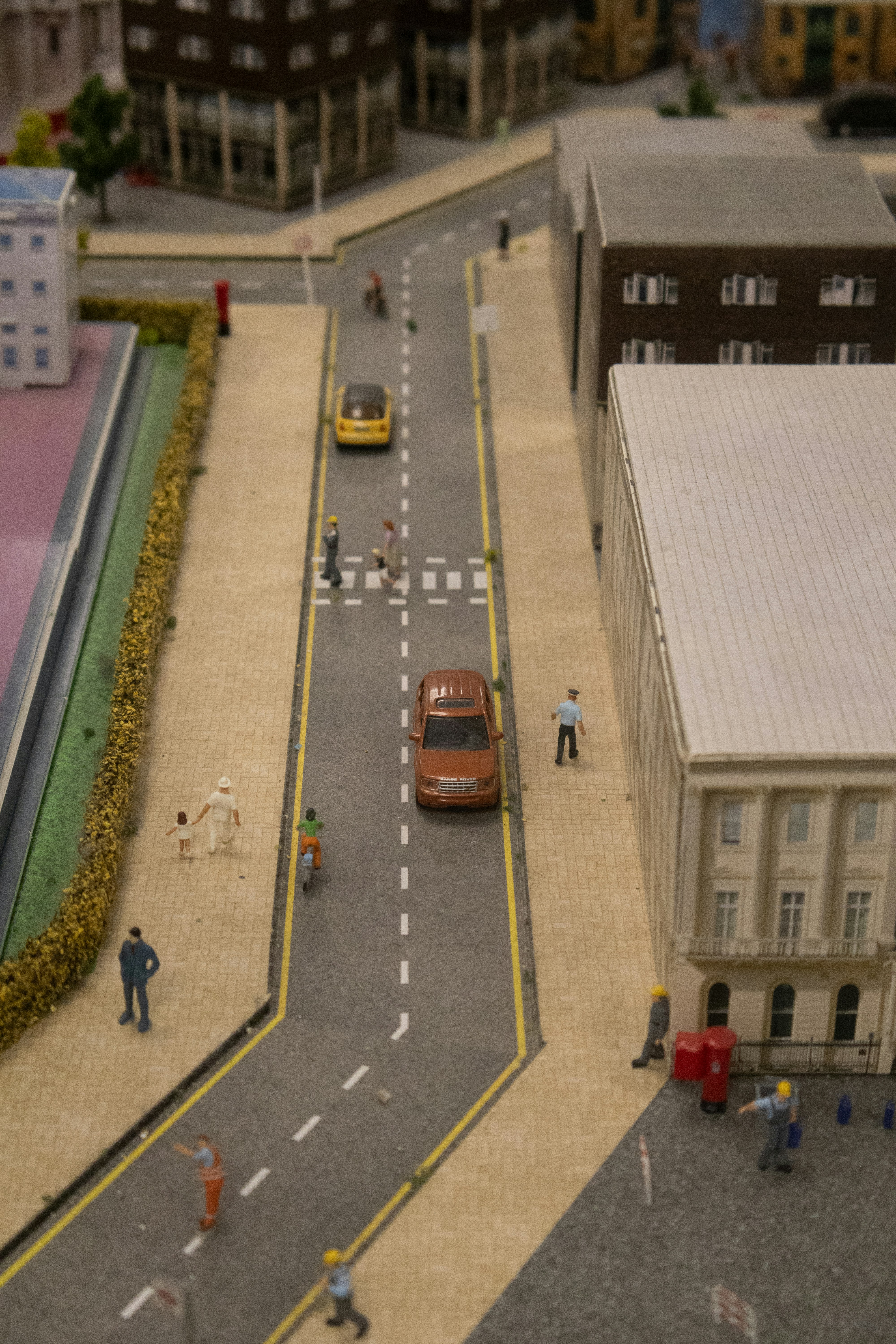 Miniature street scene with tiny people and cars. photo – Free Traffic ...