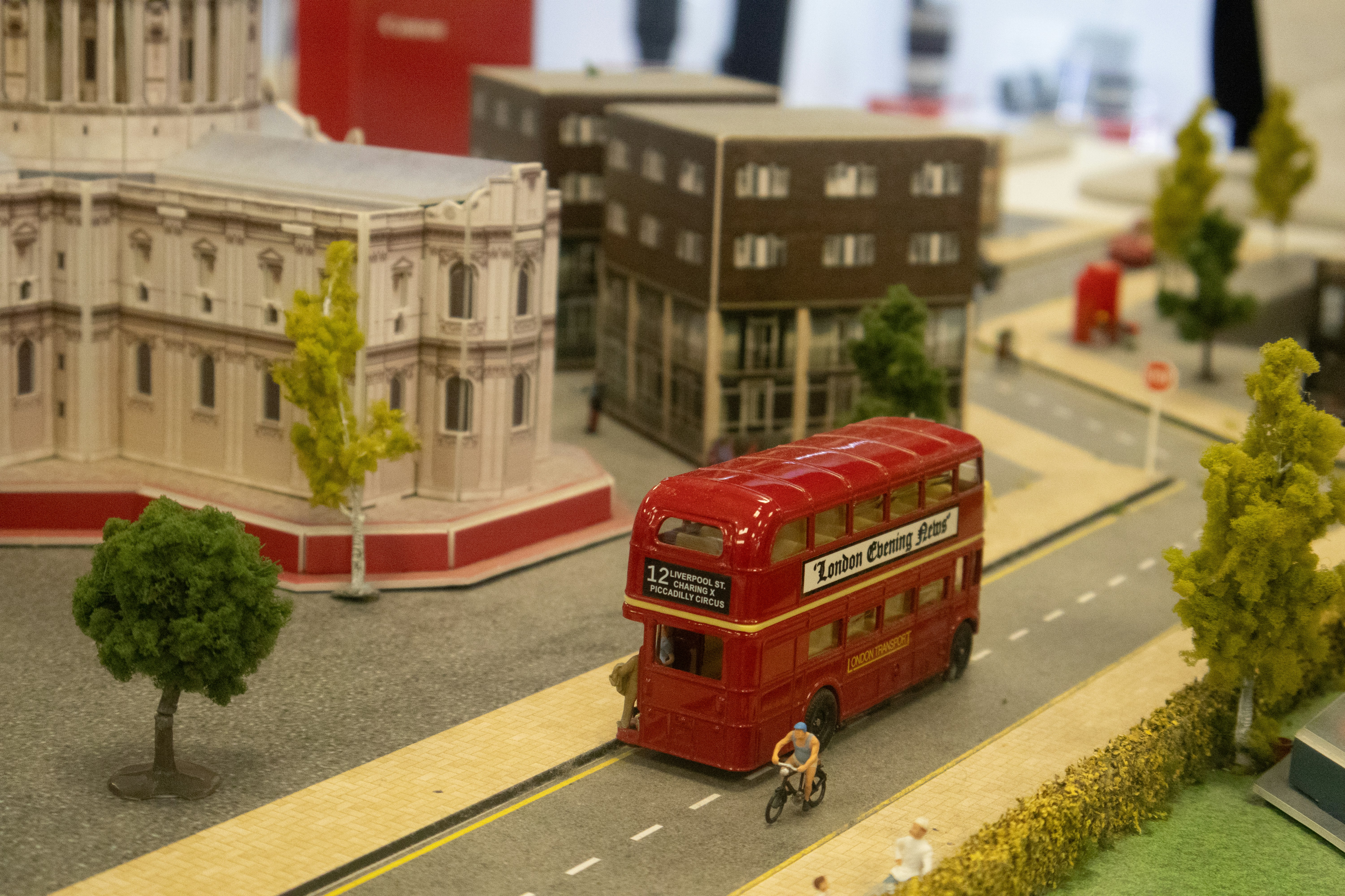Red Double-Decker on a Toy Town Street: A Micro-Model Moment