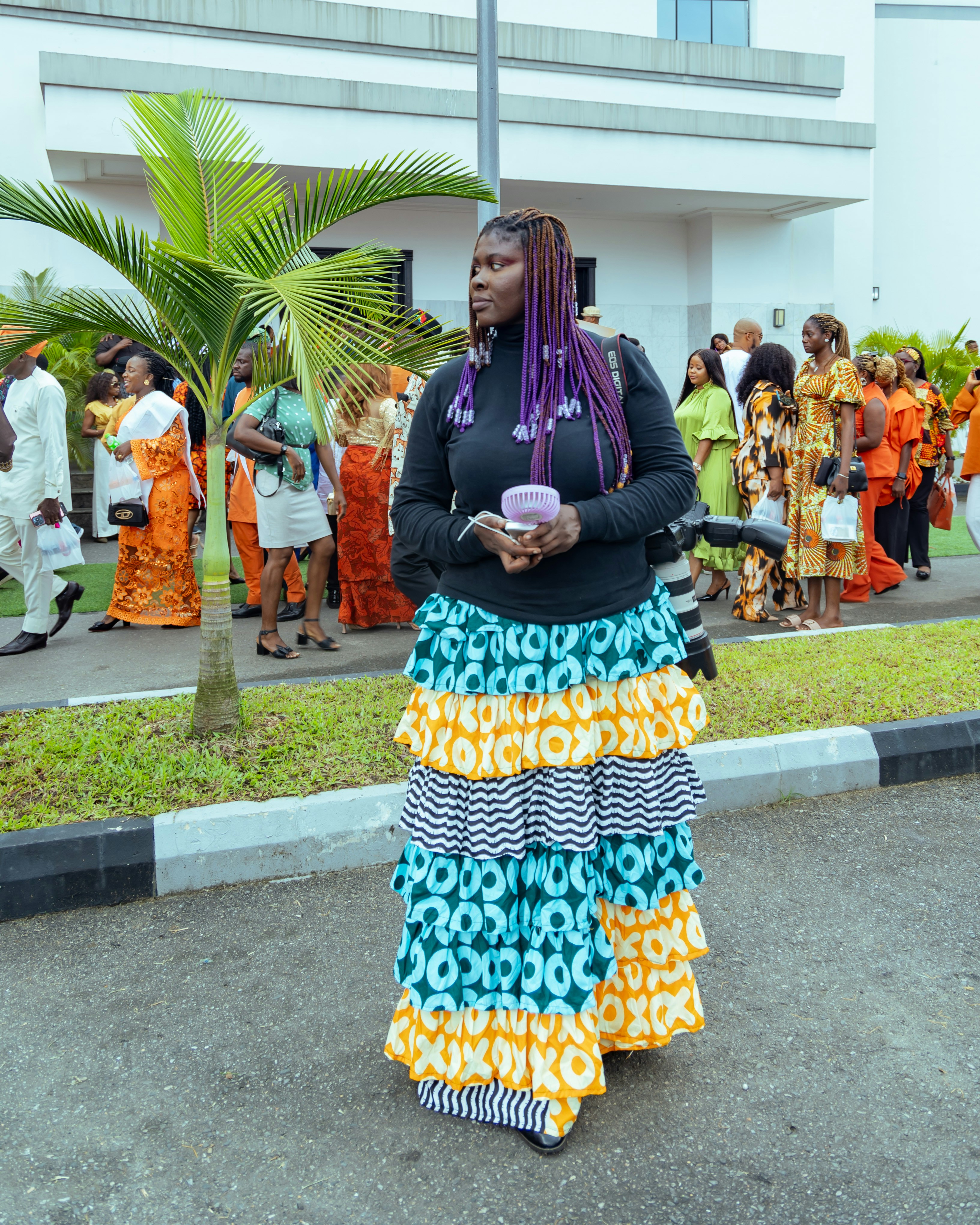 Colorful Cascades: A Bold Tiered Skirt Stands Out at an Outdoor Gathering