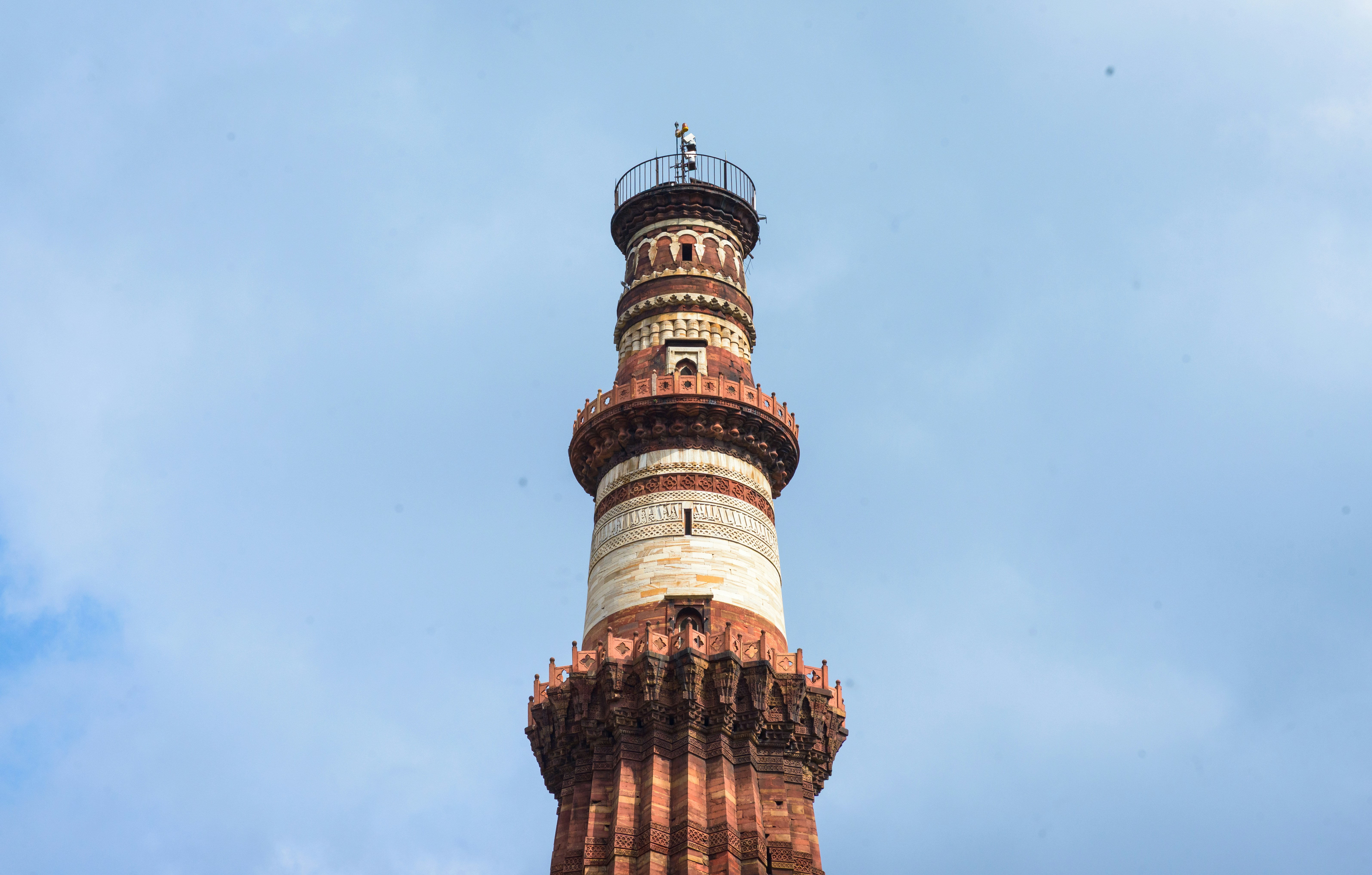 Brick Beacon Against a Cerulean Sky: The Lantern Tower Reaches Up