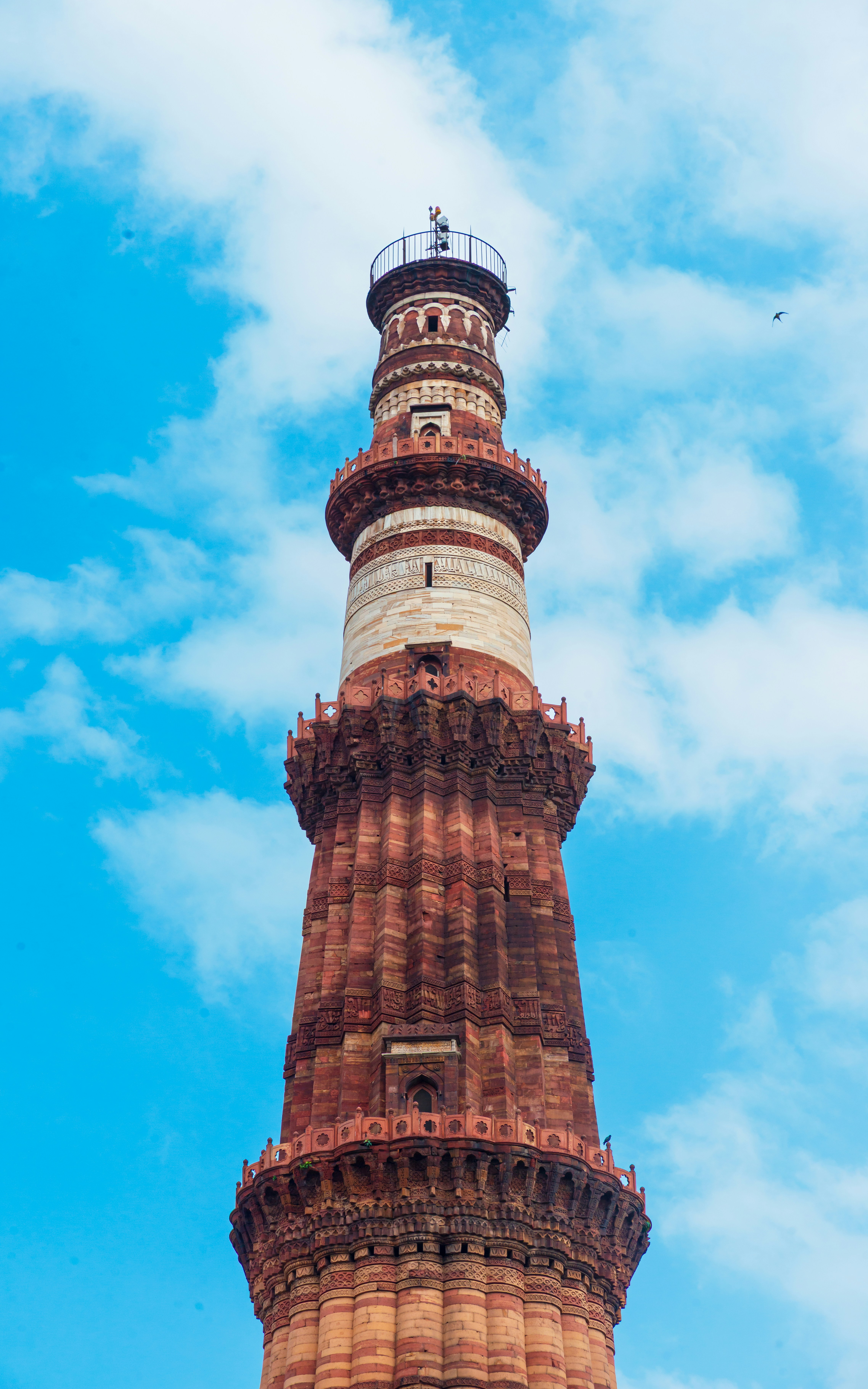 Spiral of Stone: A Red-Brick Minaret Reaching the Blue