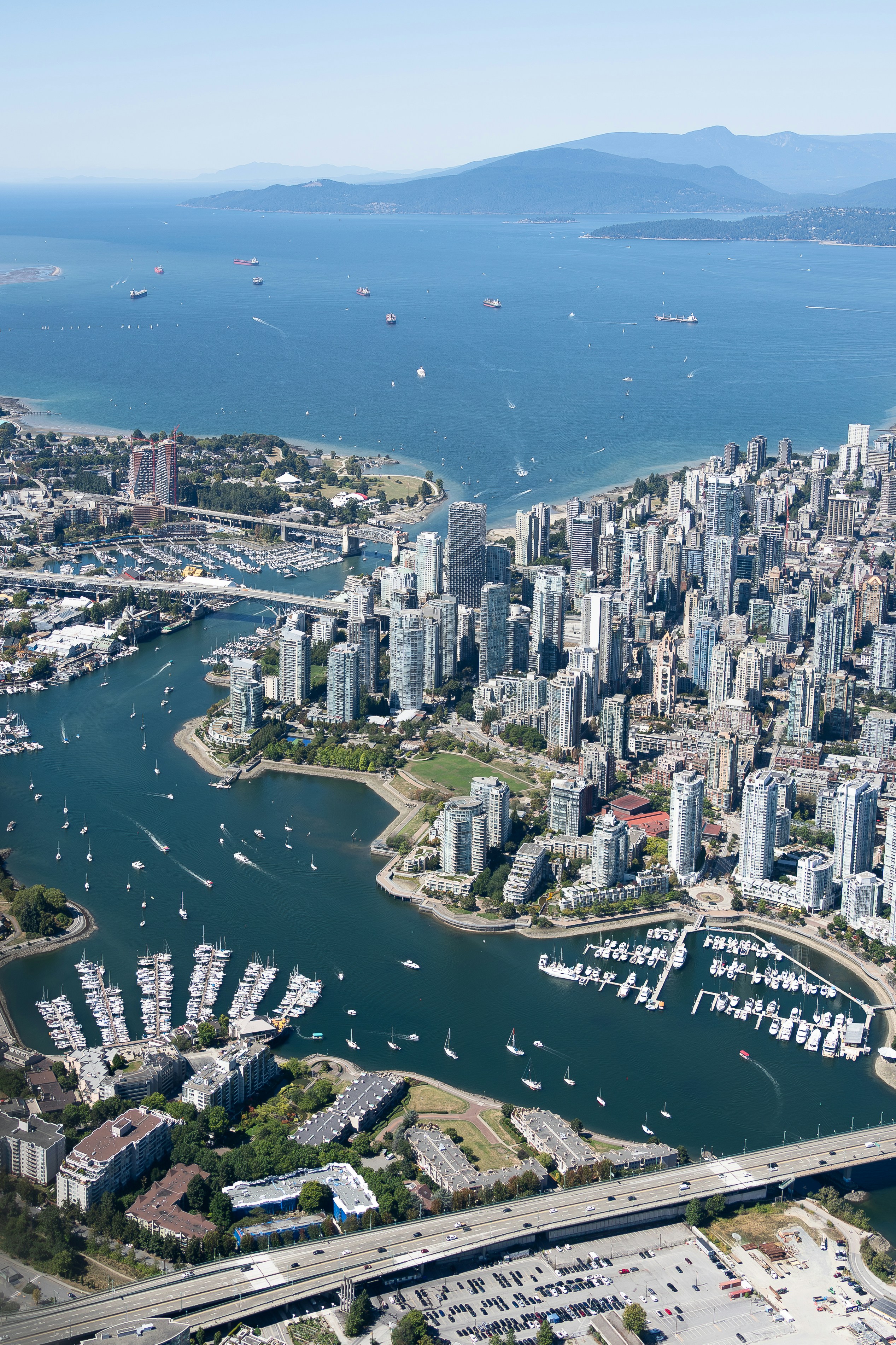Harbor Towers Rising: A Bird's-Eye View of Marina Corridors and City Skyline