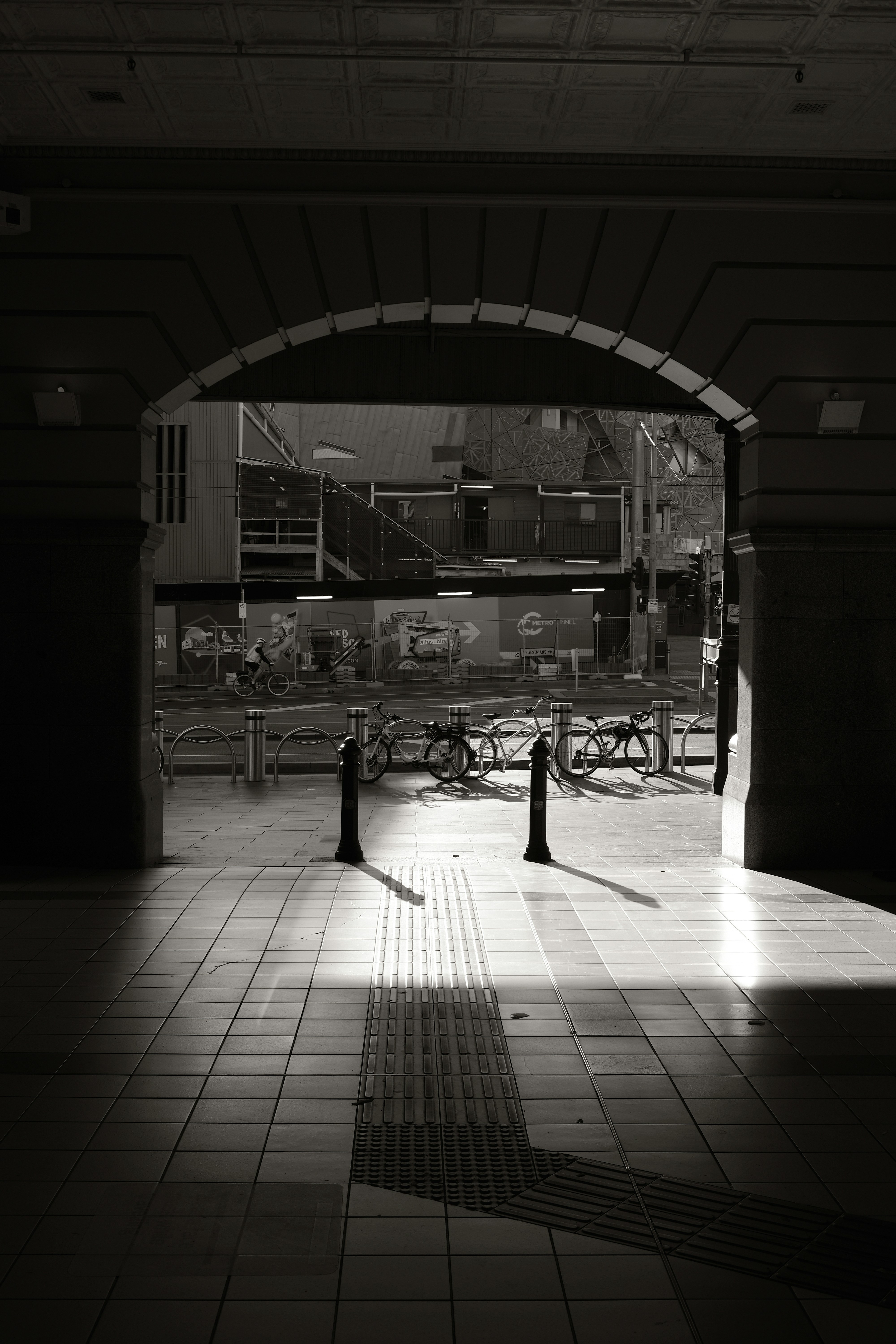 Archway to Daylight: Quiet Transit Frame in Monochrome