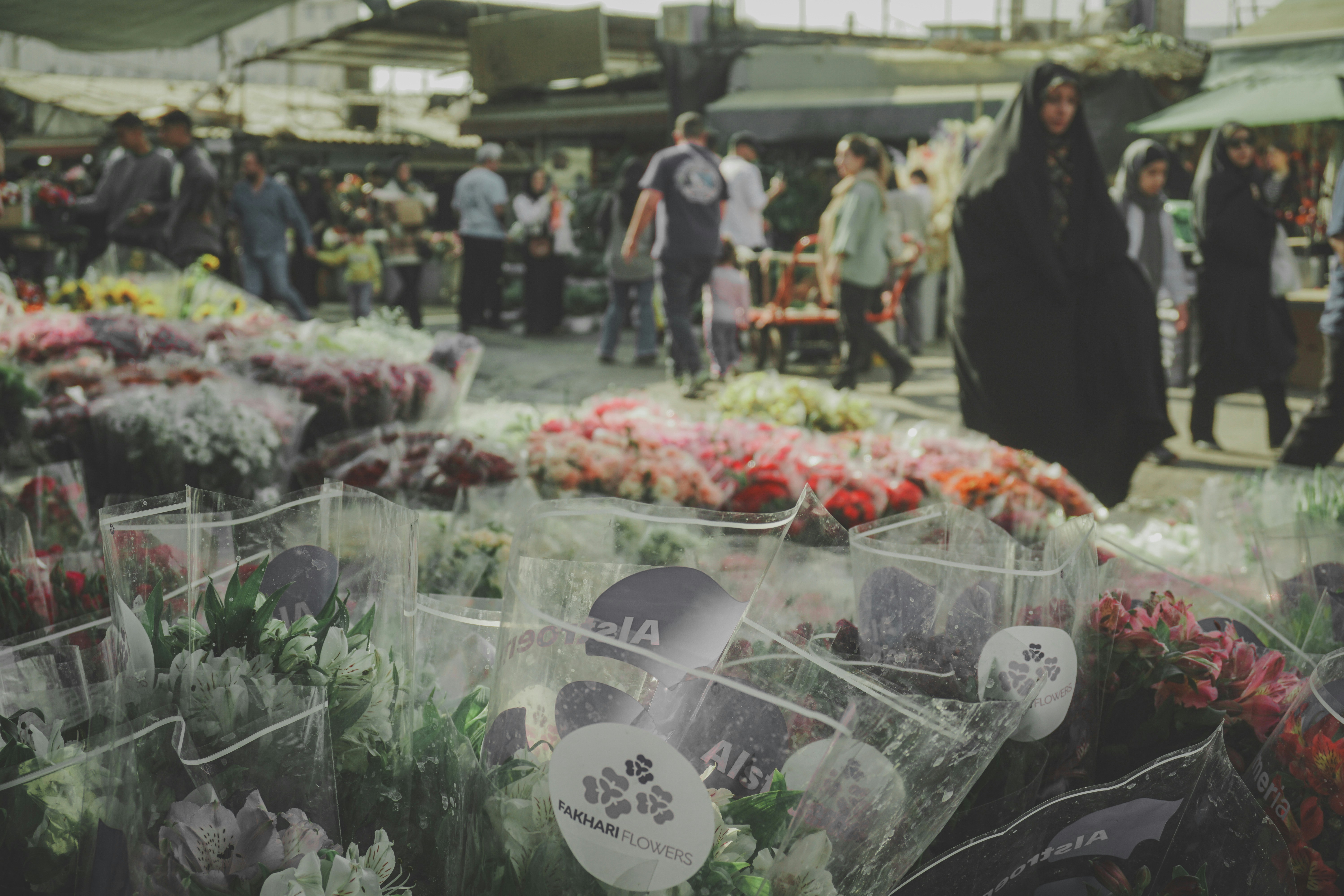 Translucent Blooms, Bustling Aisles: A Market Morning