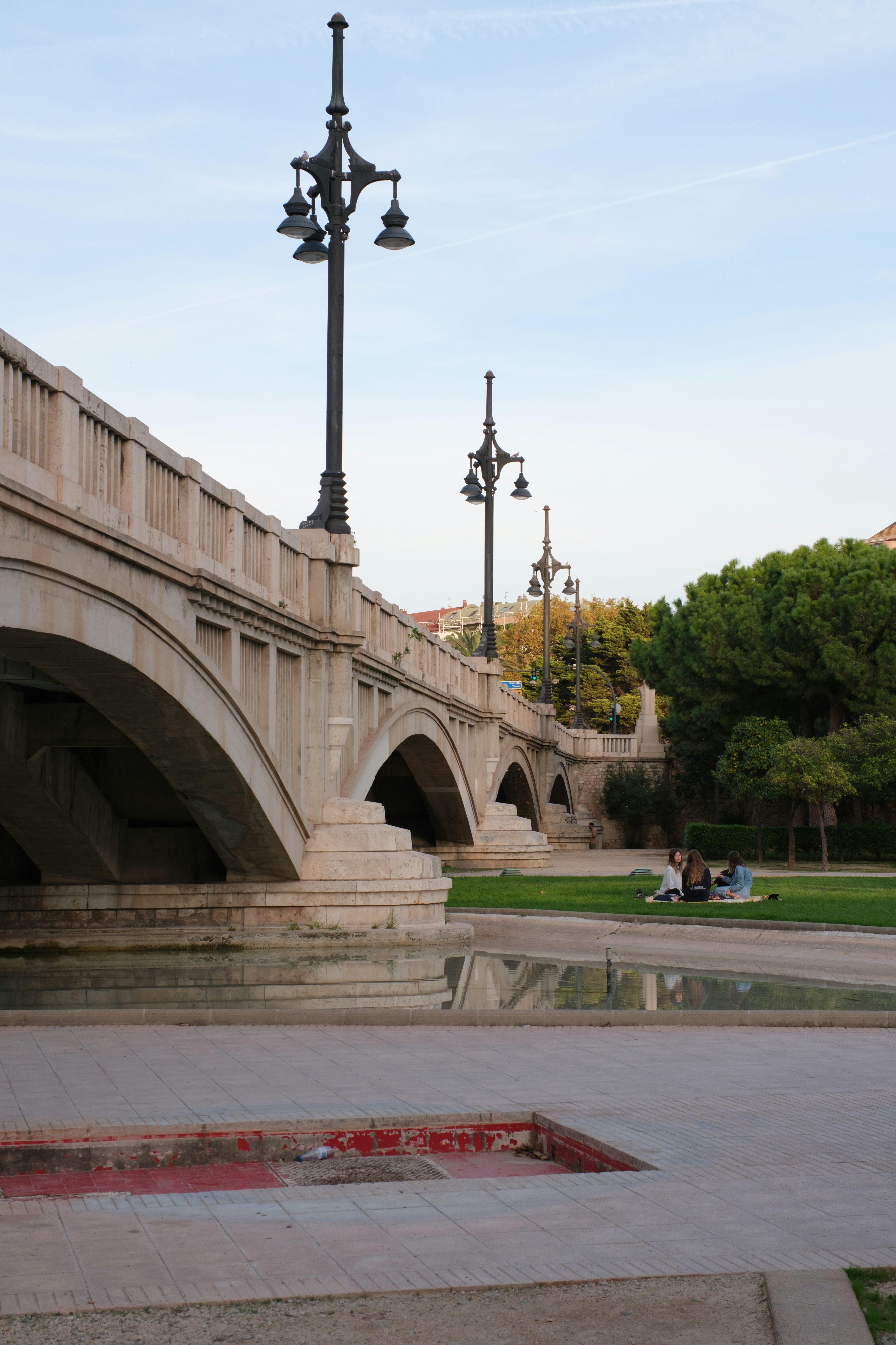 Arcade of Stone: Evening Light on a Historic Bridge