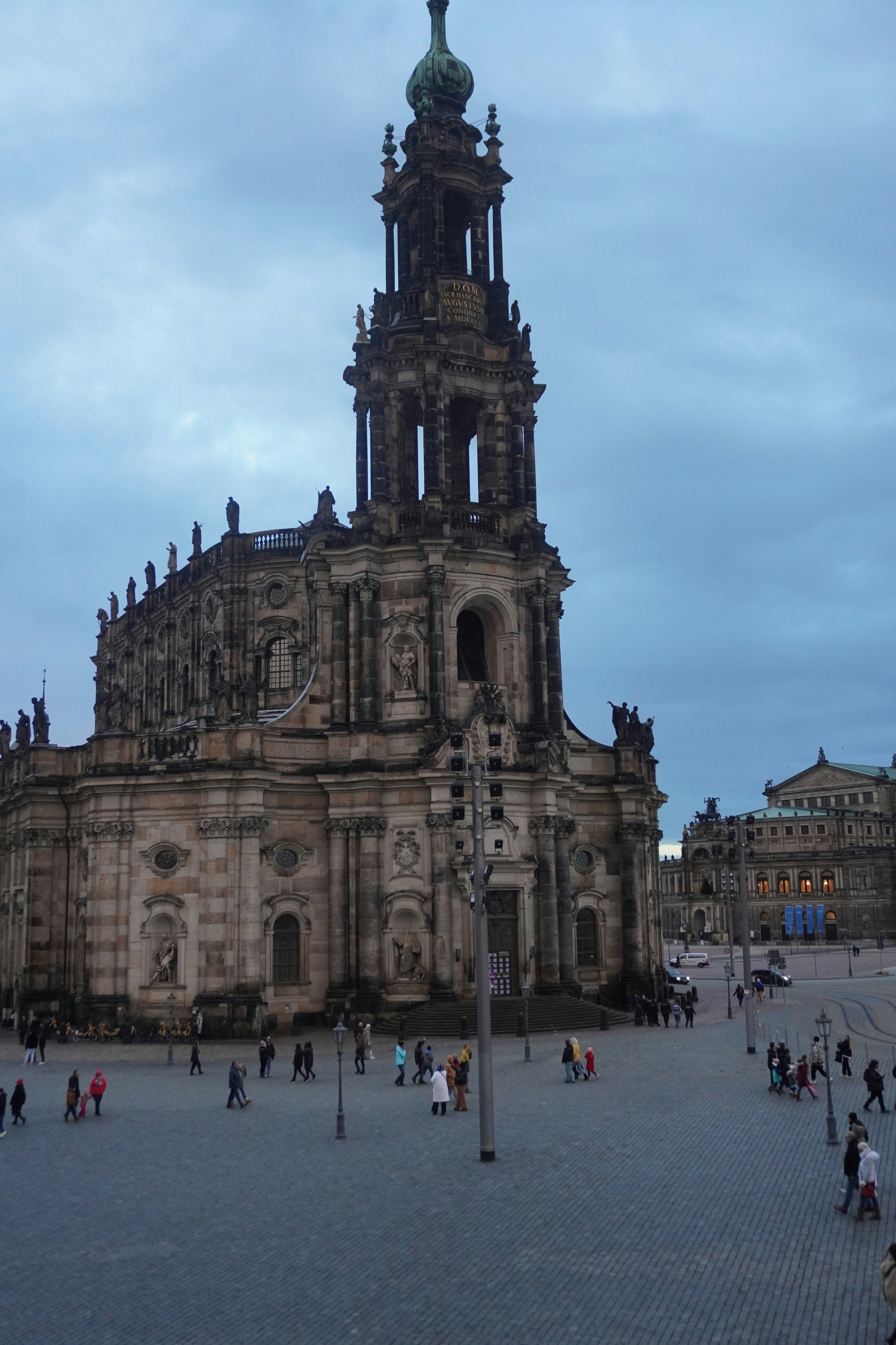 Dusky Baroque Sentinel: The Tower Rising Over a Quiet City Square