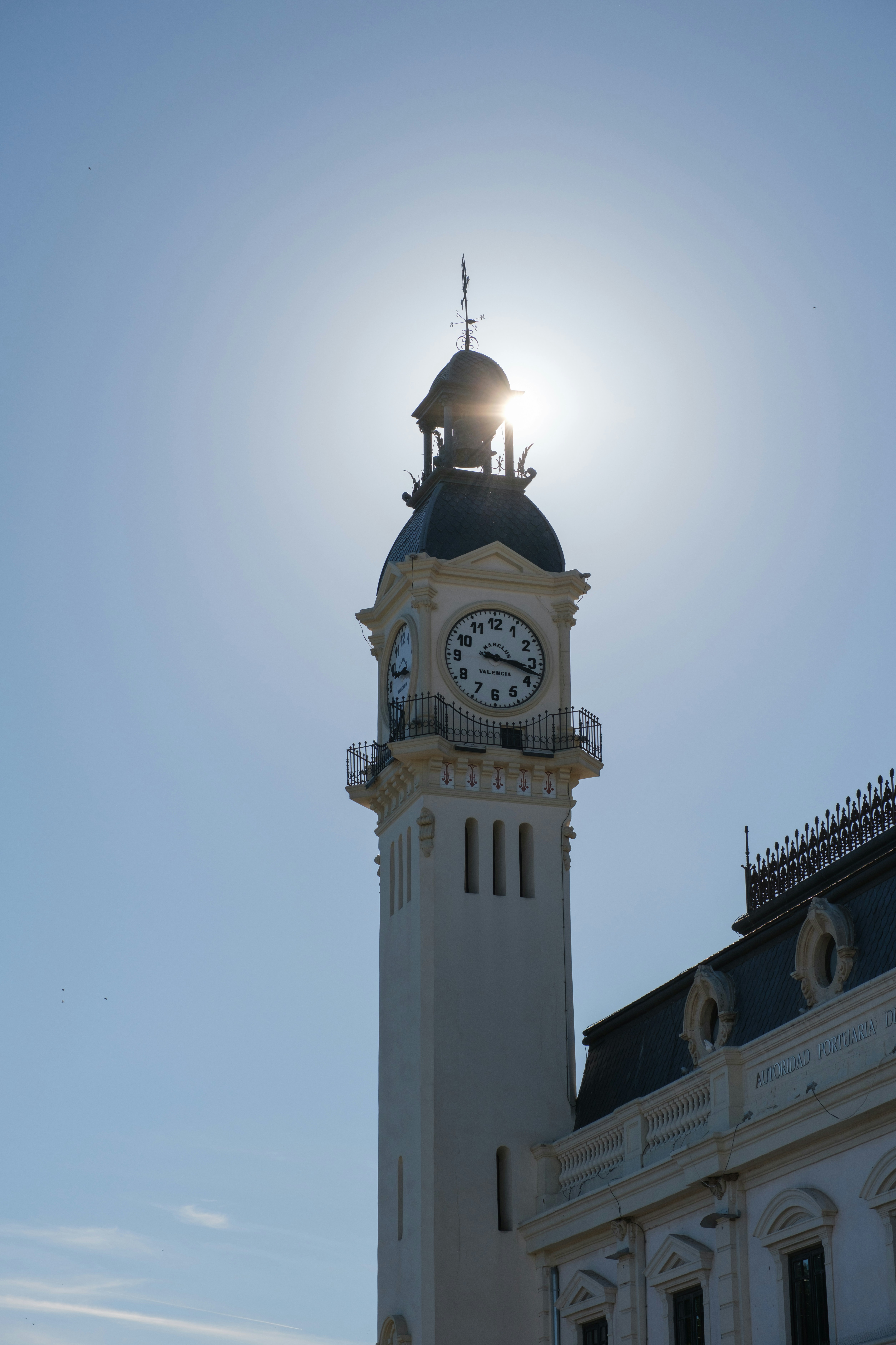 Noon Halo Over a Neoclassical Clock Tower