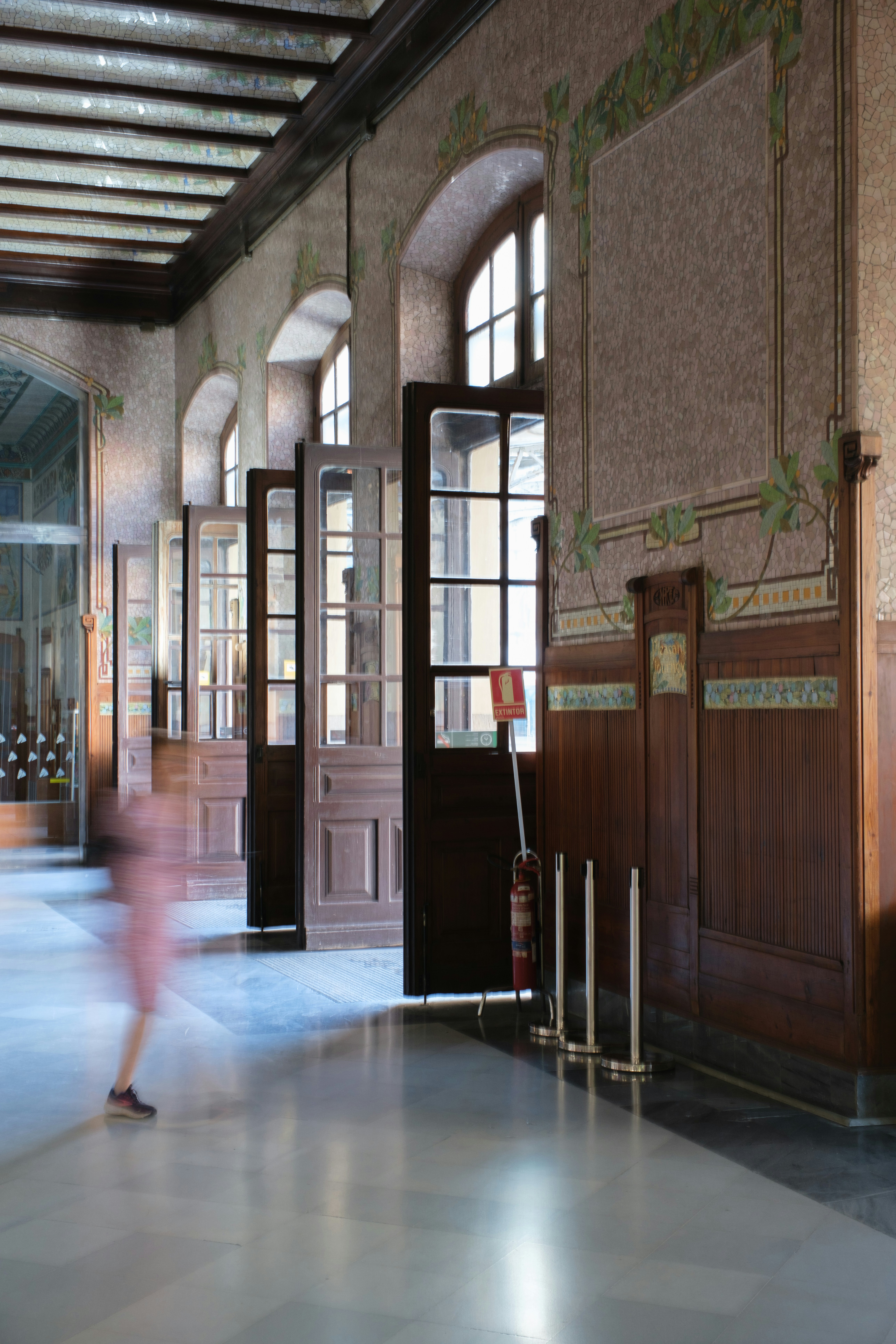 Whispers Through a Corridor of Open Doors: Light, Wood, and Glass