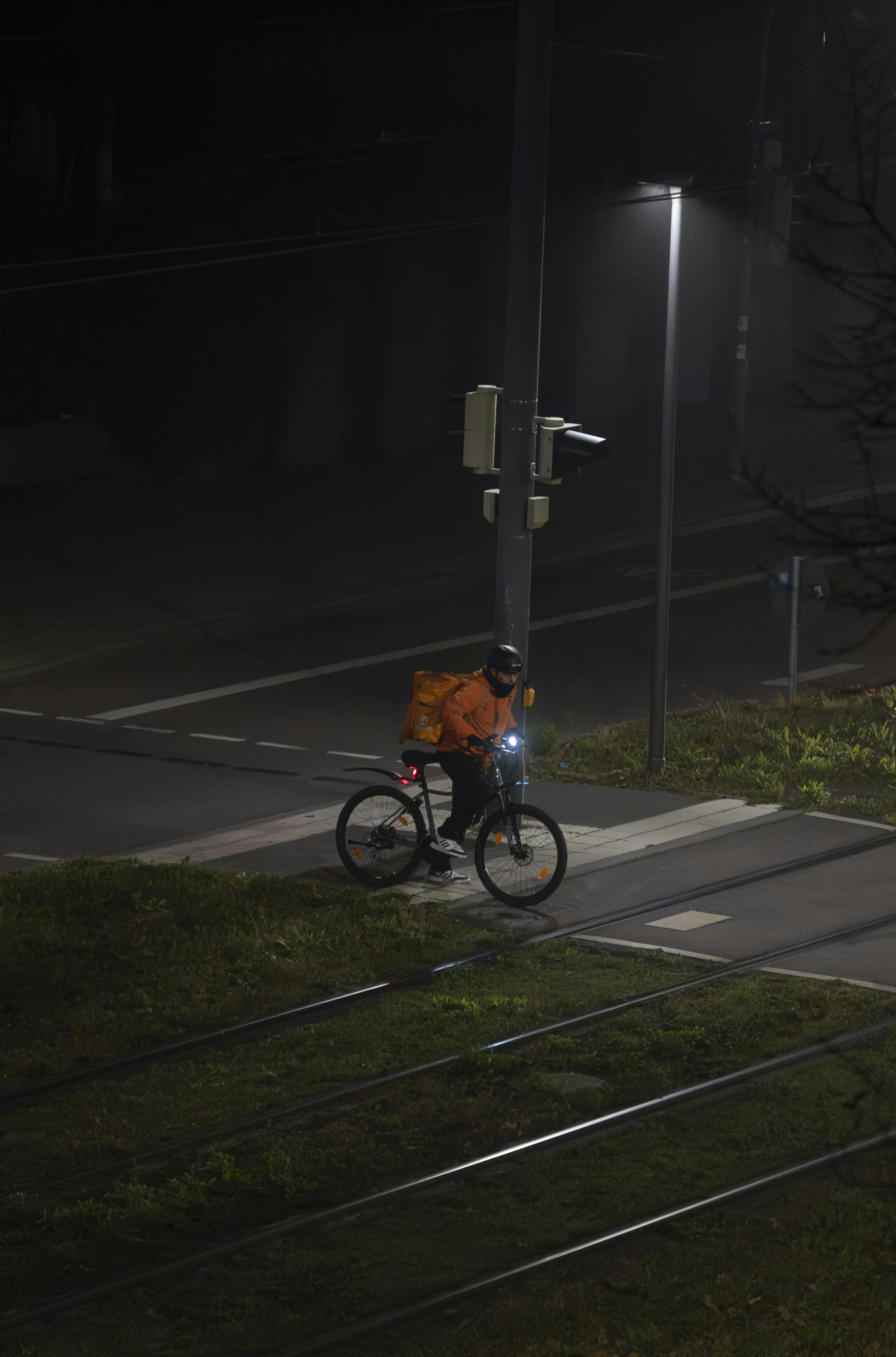 Night Shift Courier on Quiet Tram Rails