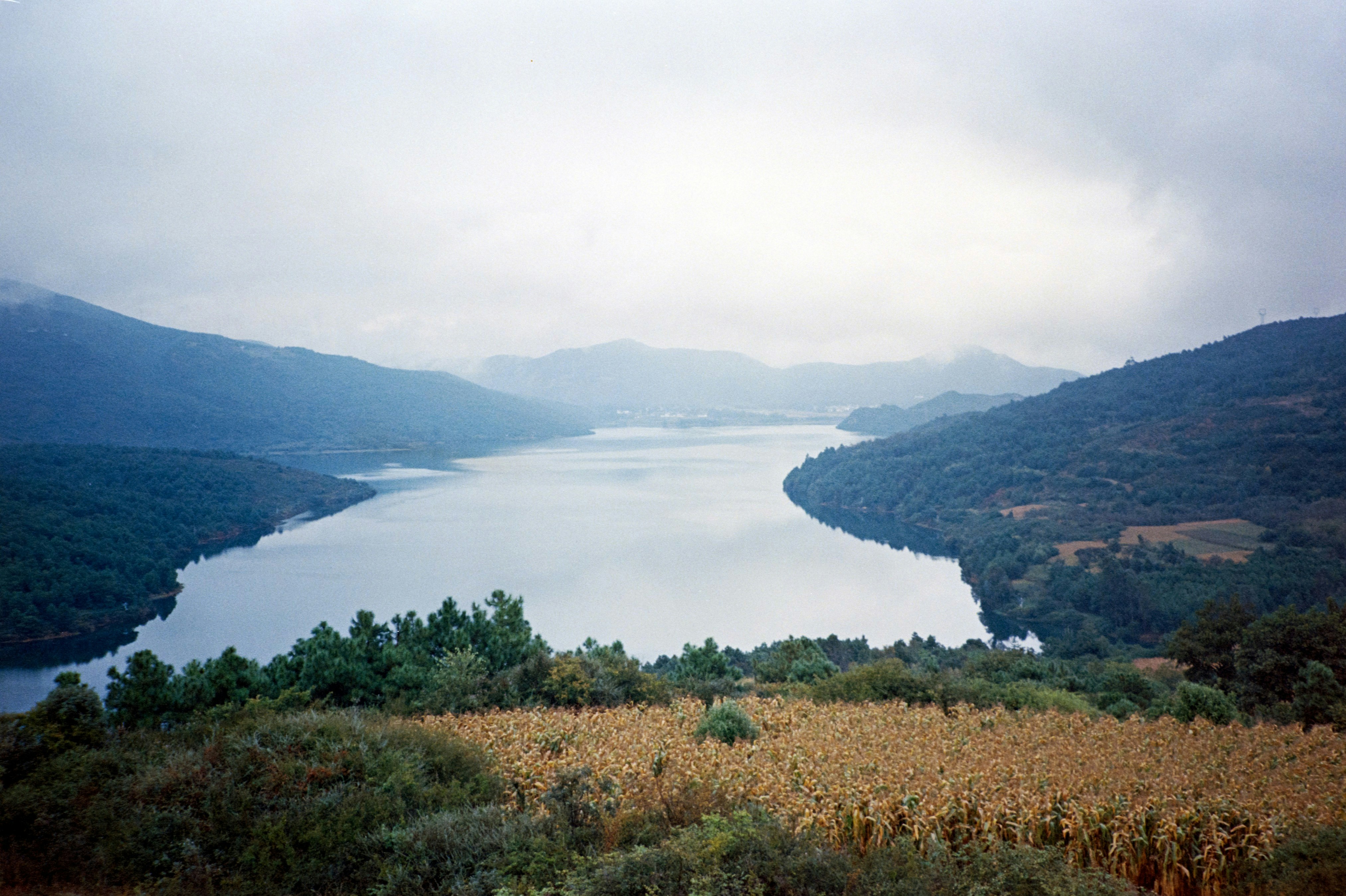 Silvery Ribbon Across a Mountain Valley Lake