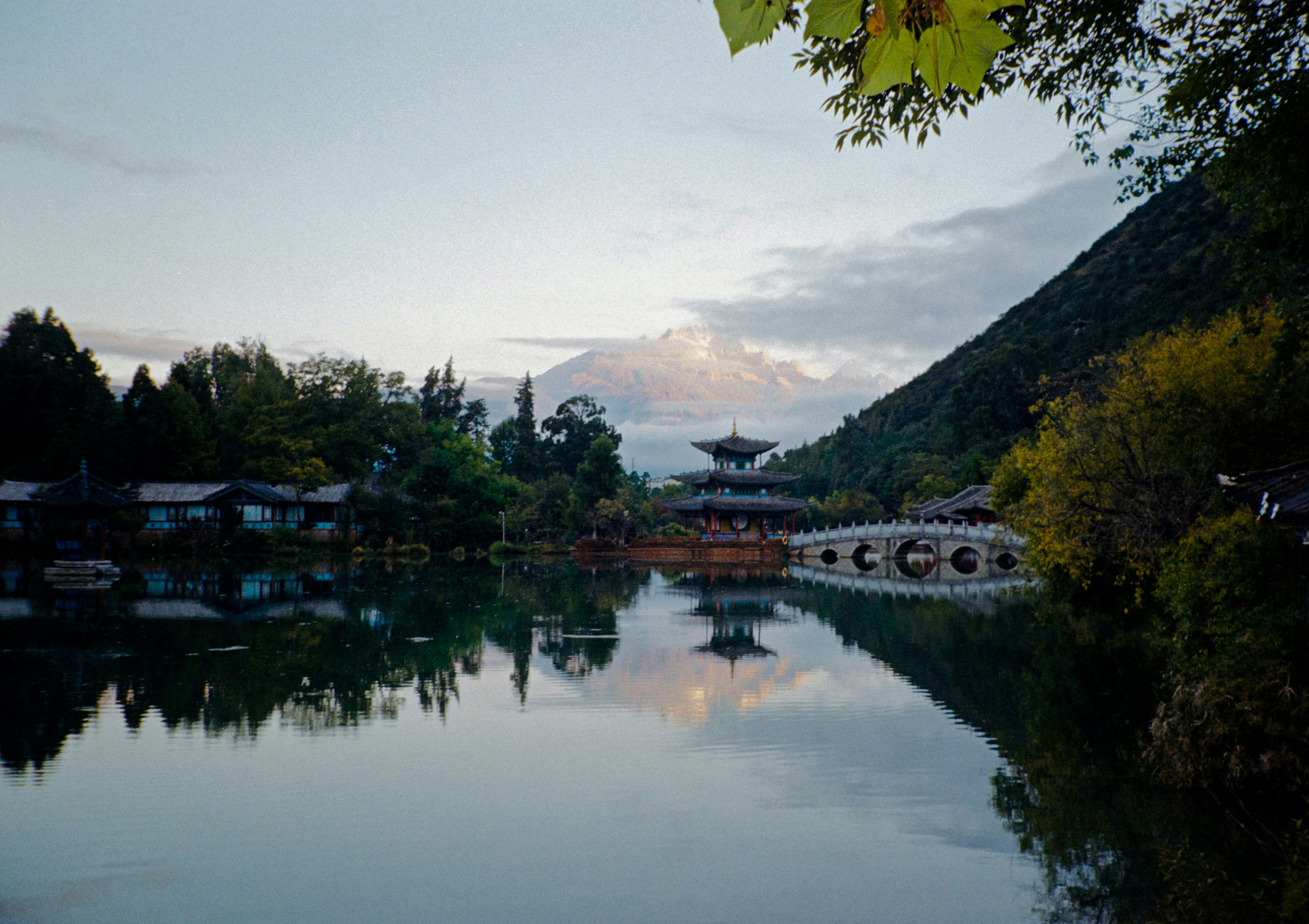 Dusk on the Silent Lake: Pagoda, Bridge, and Reflections