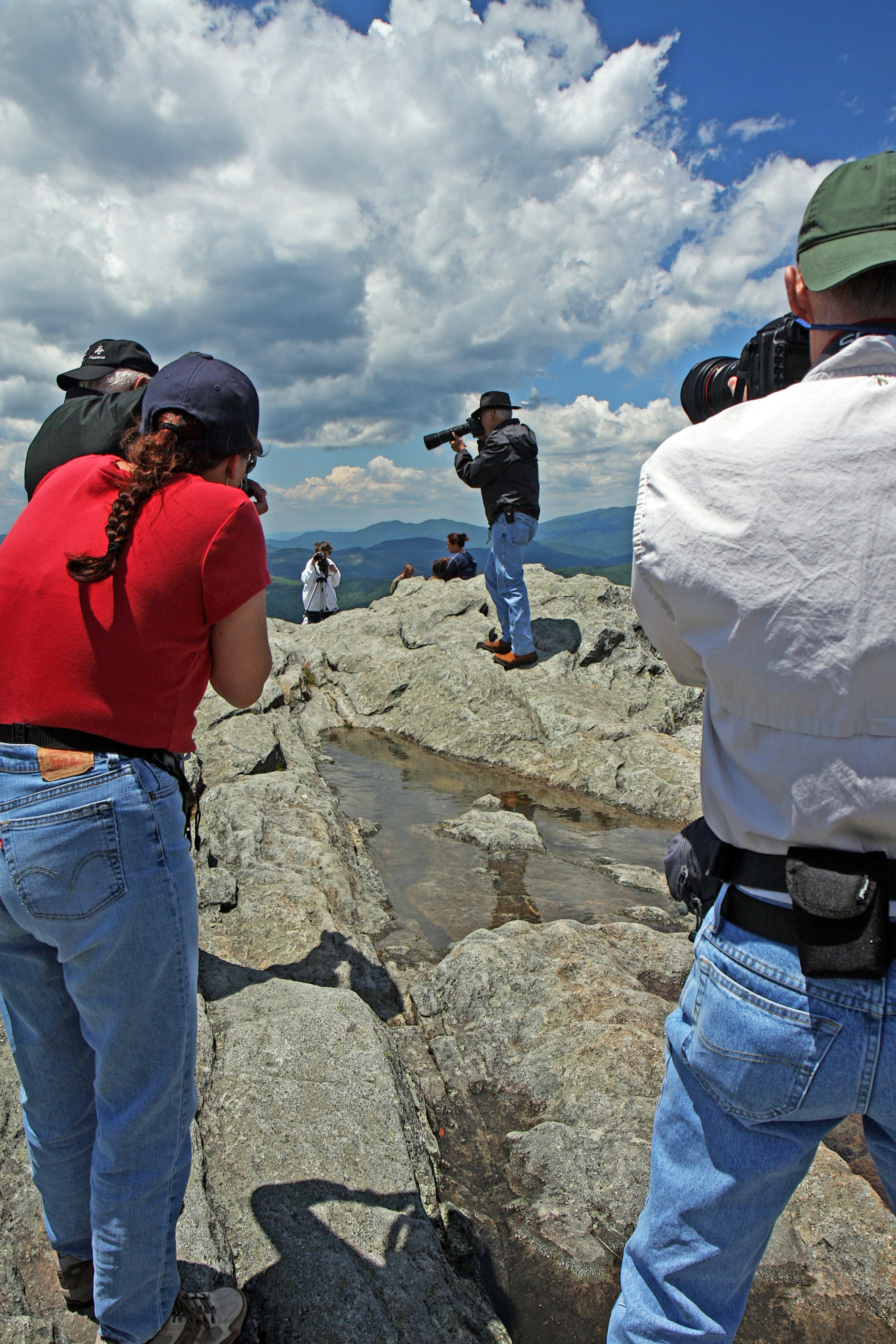 "The Photographers" --- Photographers doing what photographers do.