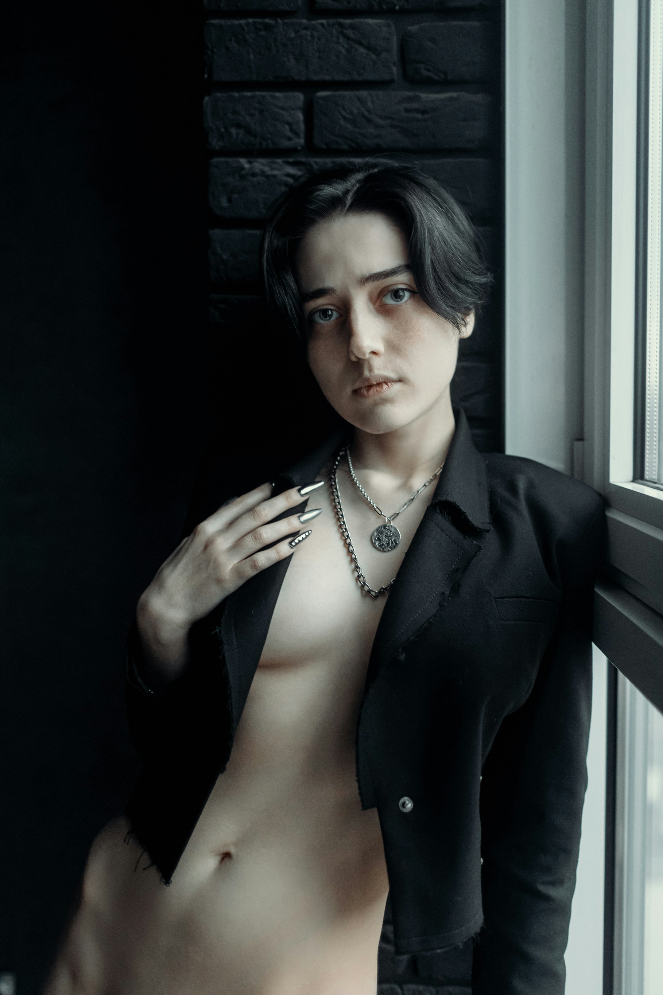 Face at the Window: Noir Blazer Portrait with Silver Chains