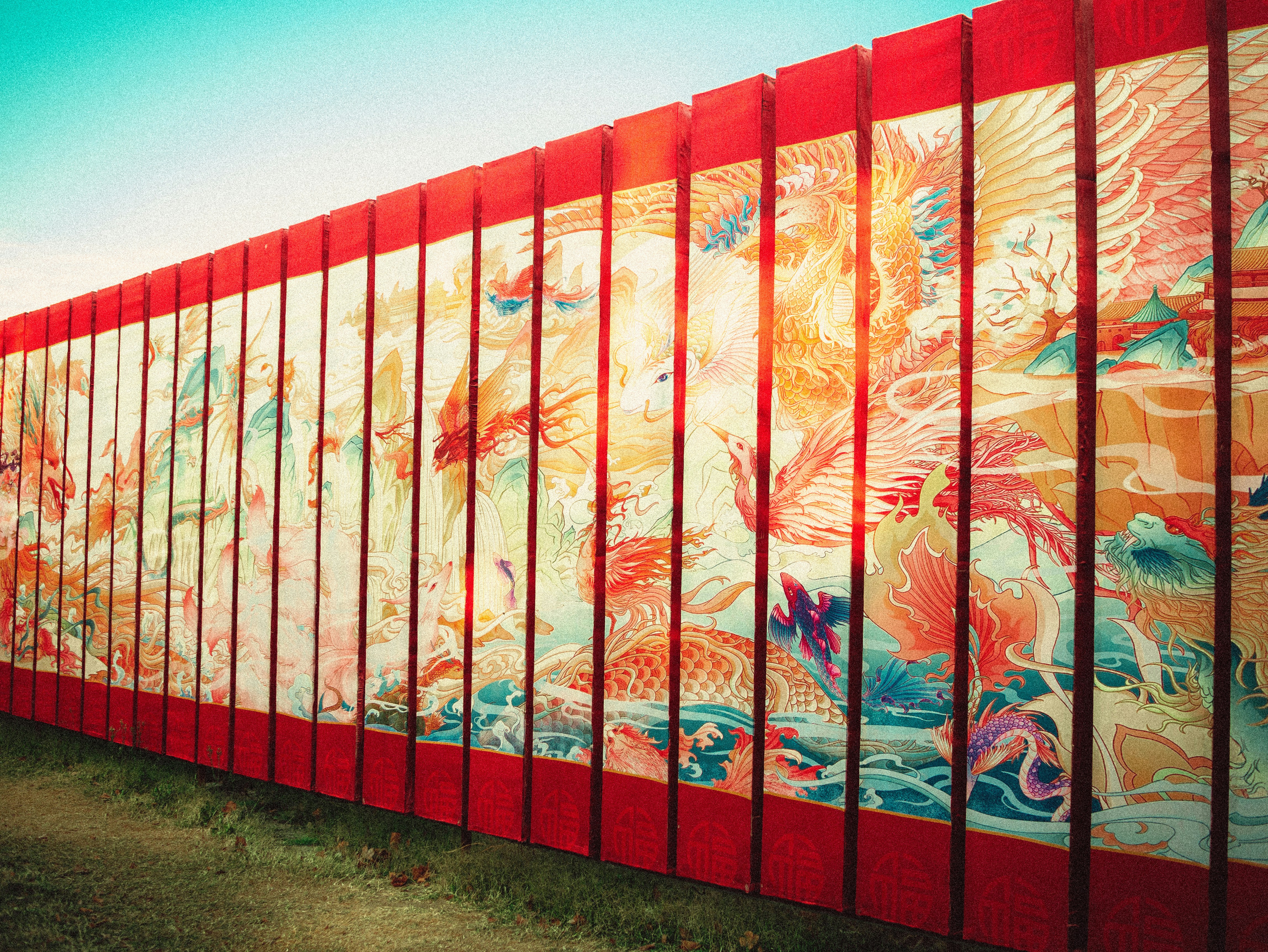 Crimson Panel Dragon Wall: A Long Fence of Painted Legends