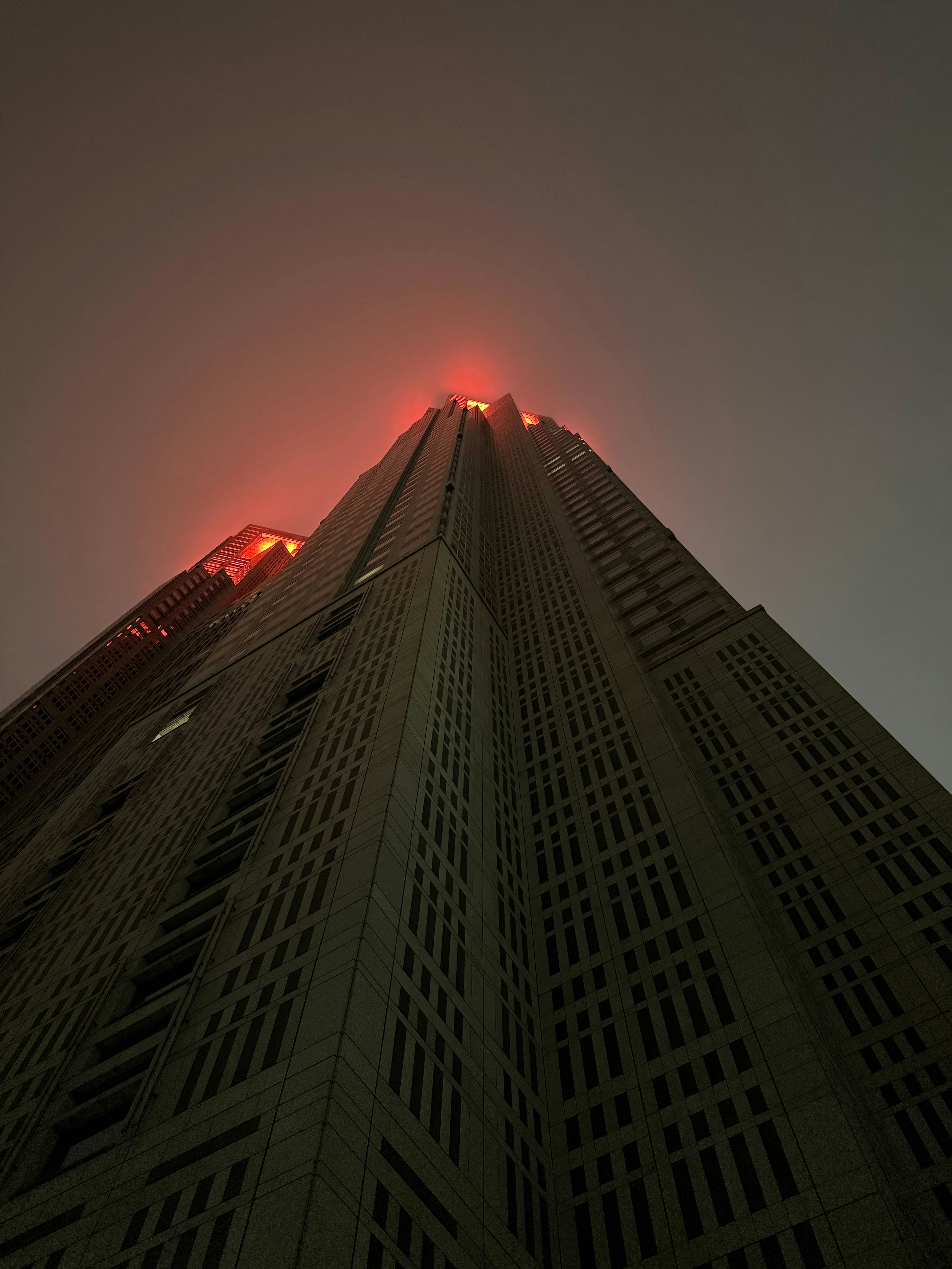 Crimson Summit: A Night-Tall Spire Pierces the Mist
