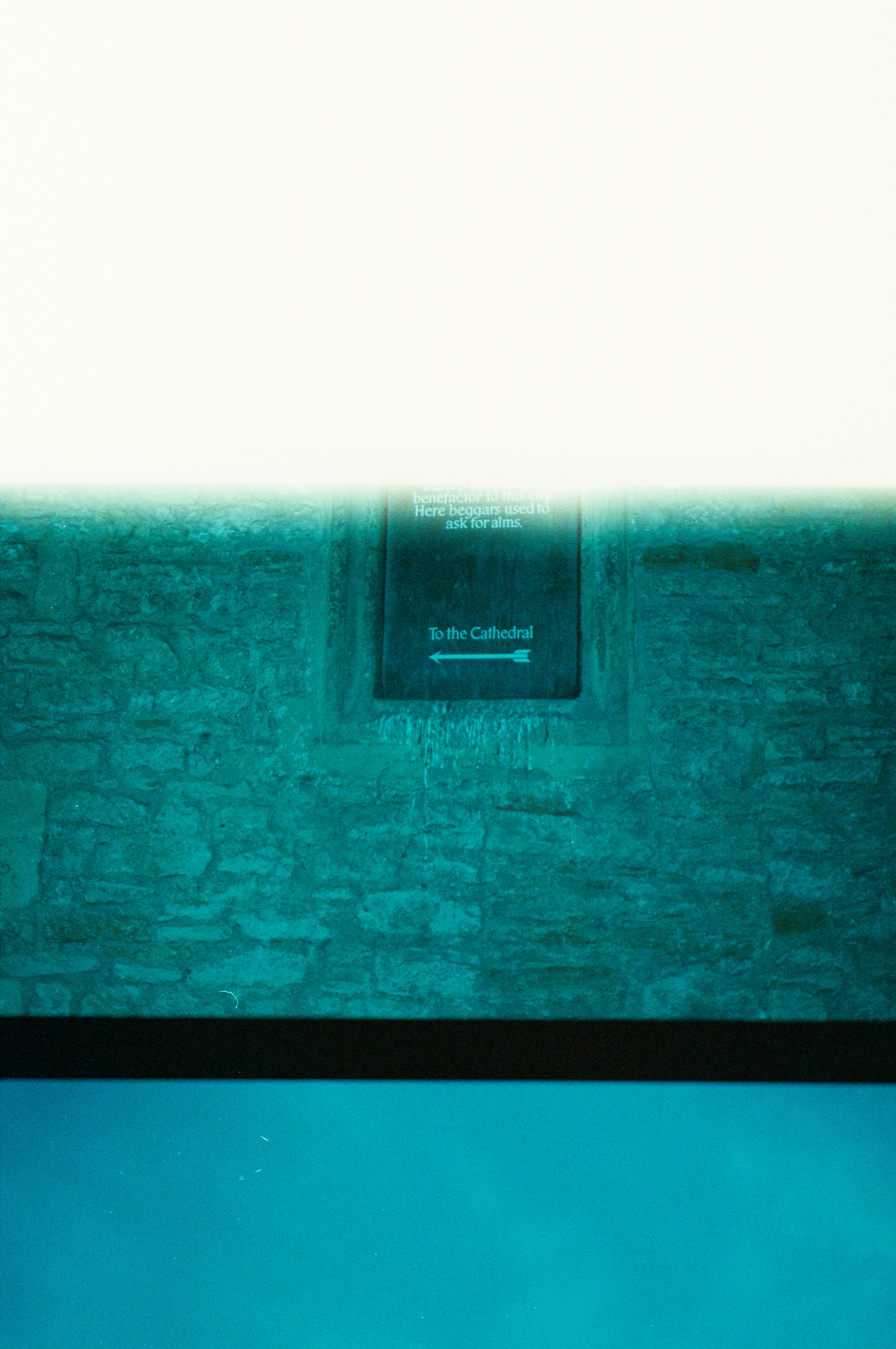 Teal Wall Compass: A Quiet Sign Pointing to the Cathedral