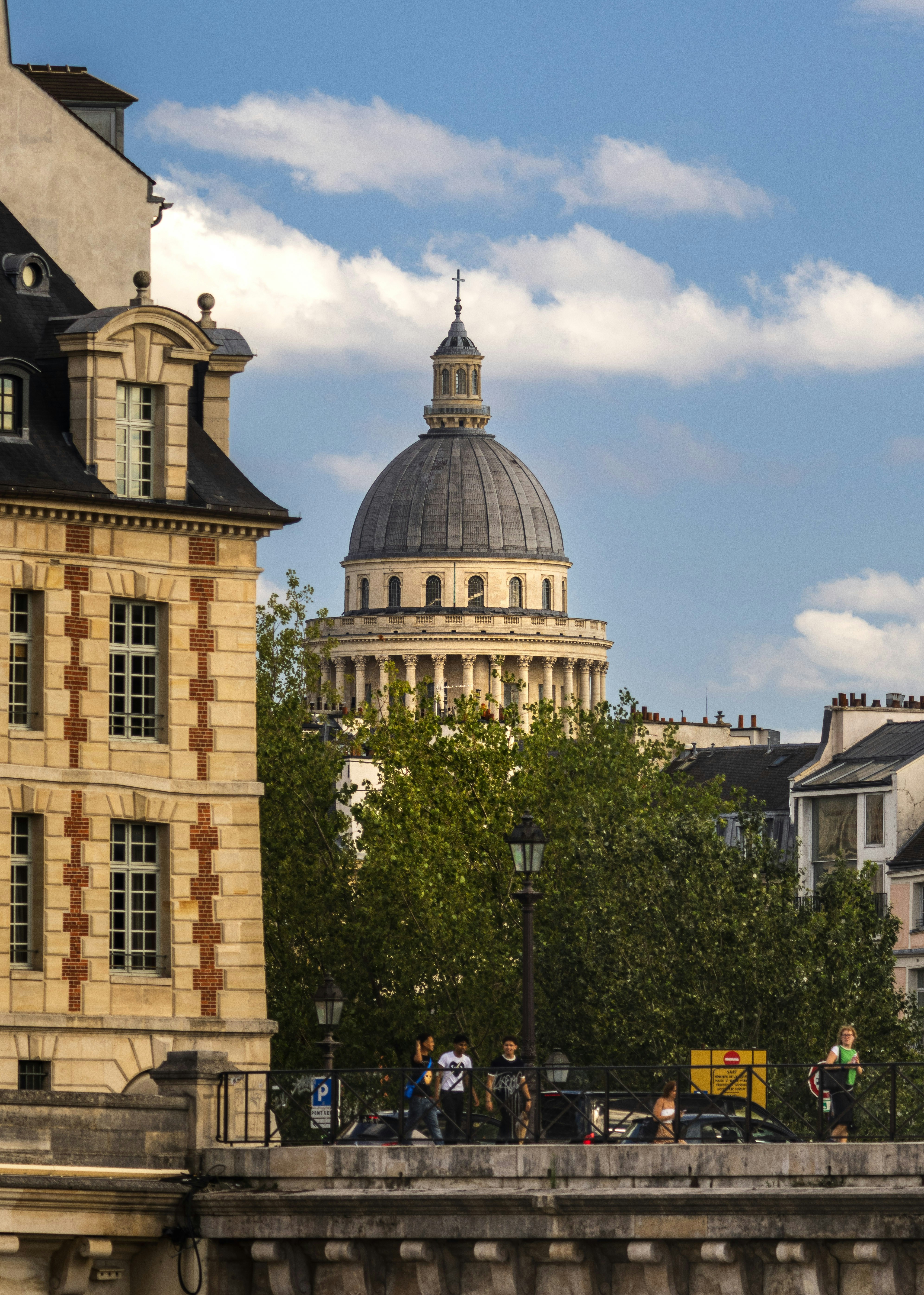 Dome Above the Seine: Parisian daylight on a riverside promenade