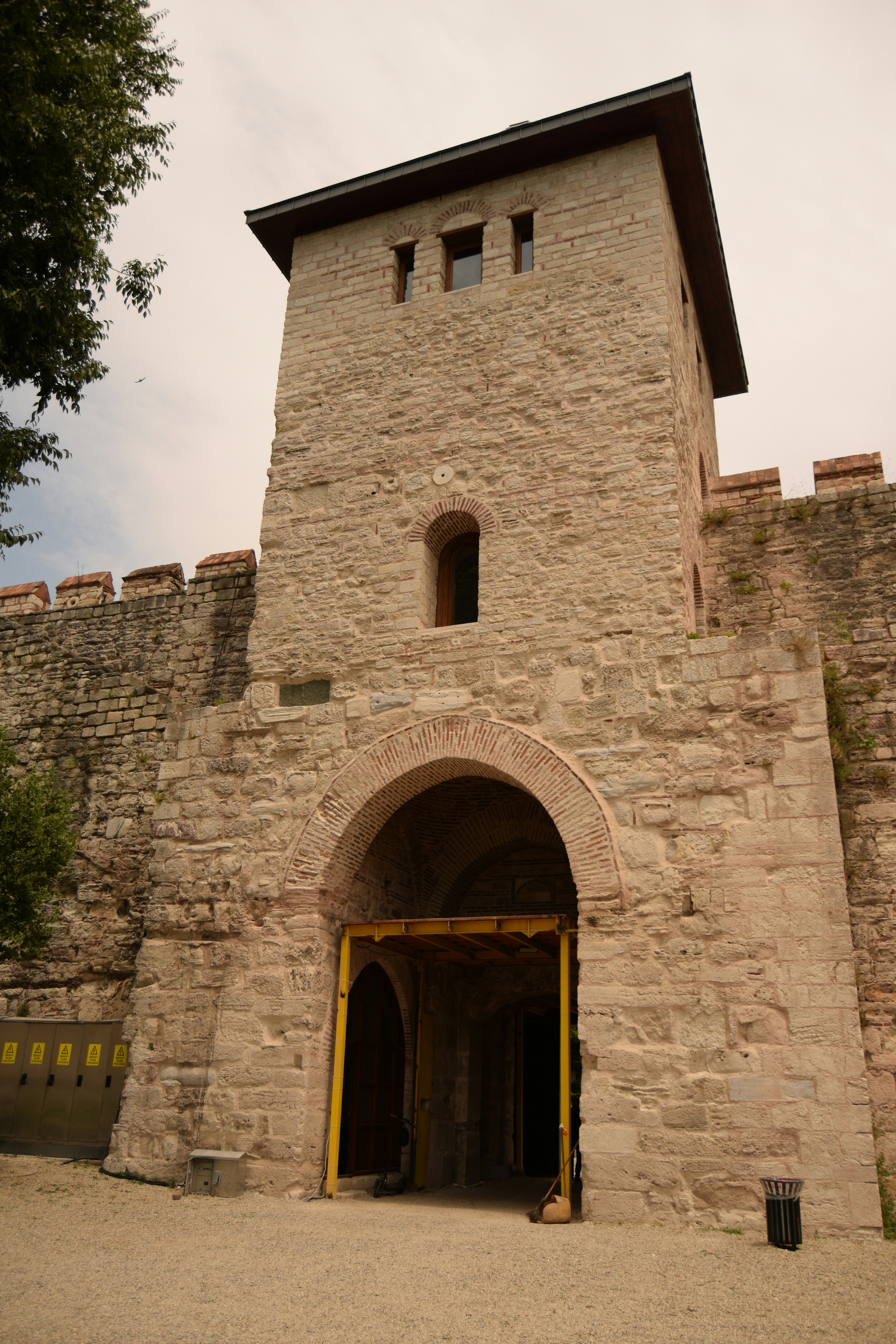 Sentinel Gate: A Towered Fortress Guarding the Arched Entrance
