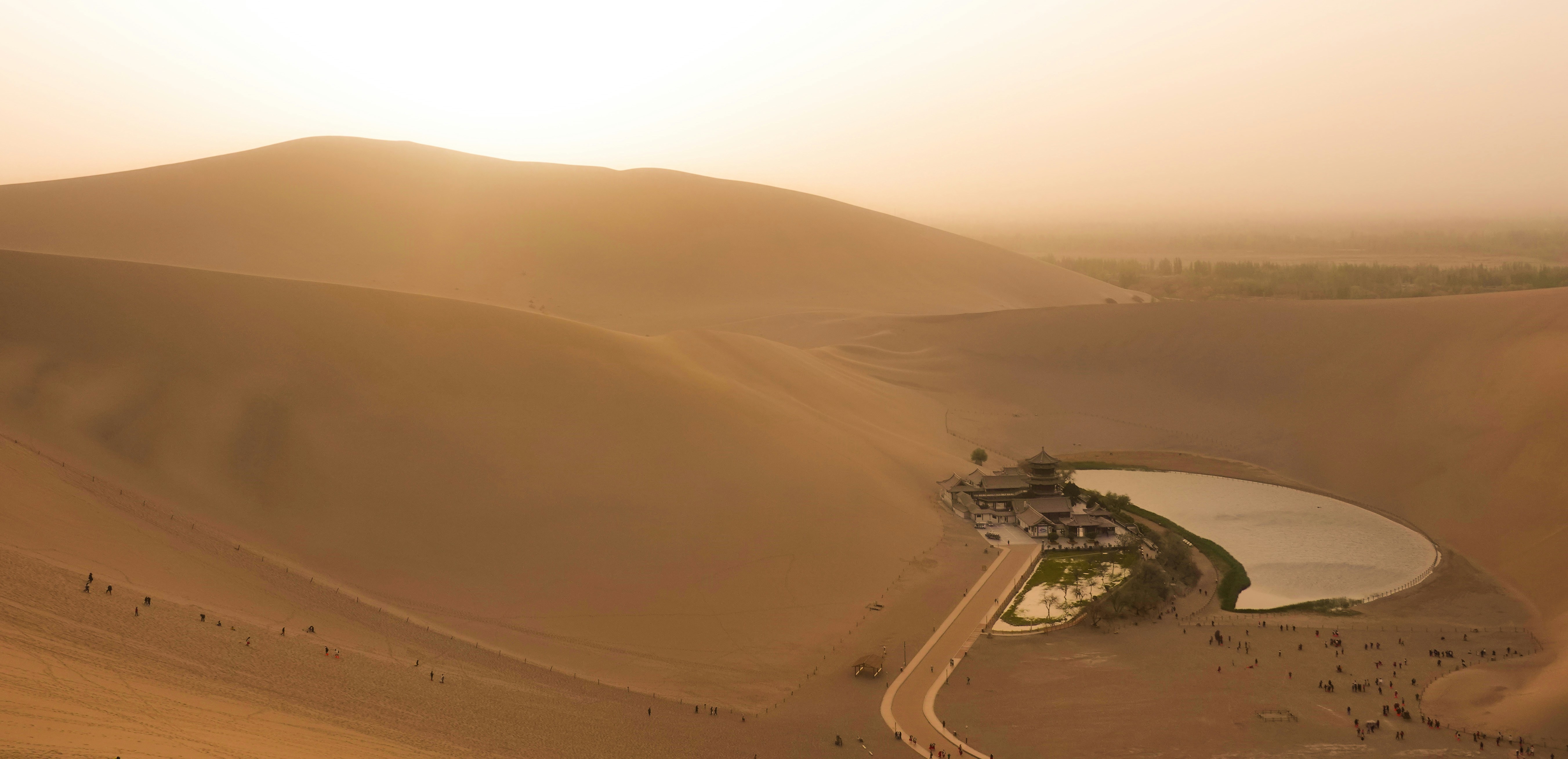 Crescent Lake at the Dune Ridge: A Winding Desert Vista