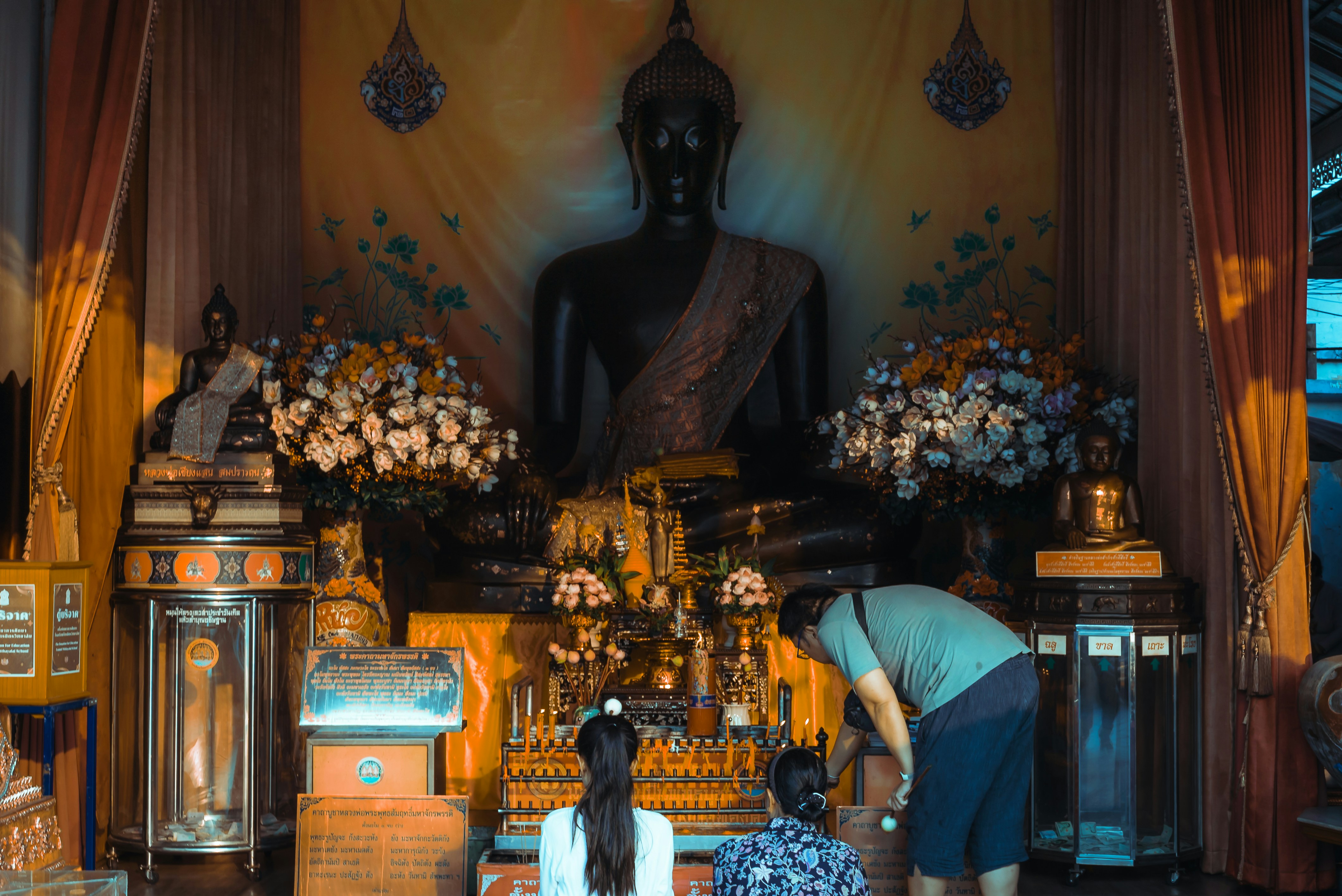 Quiet Reverence at the Buddha Altar