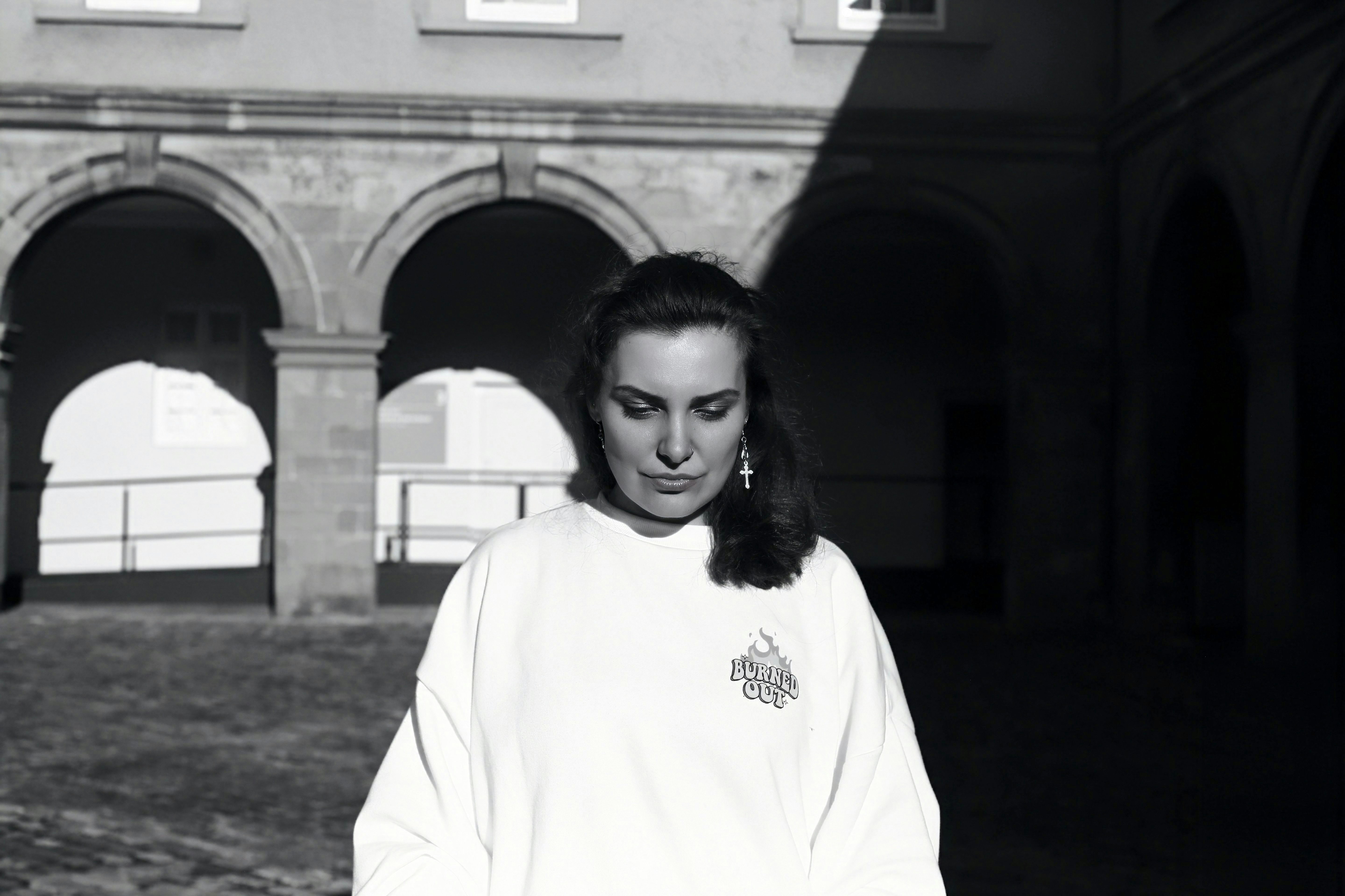Quiet Confidence Under Cloister Arches