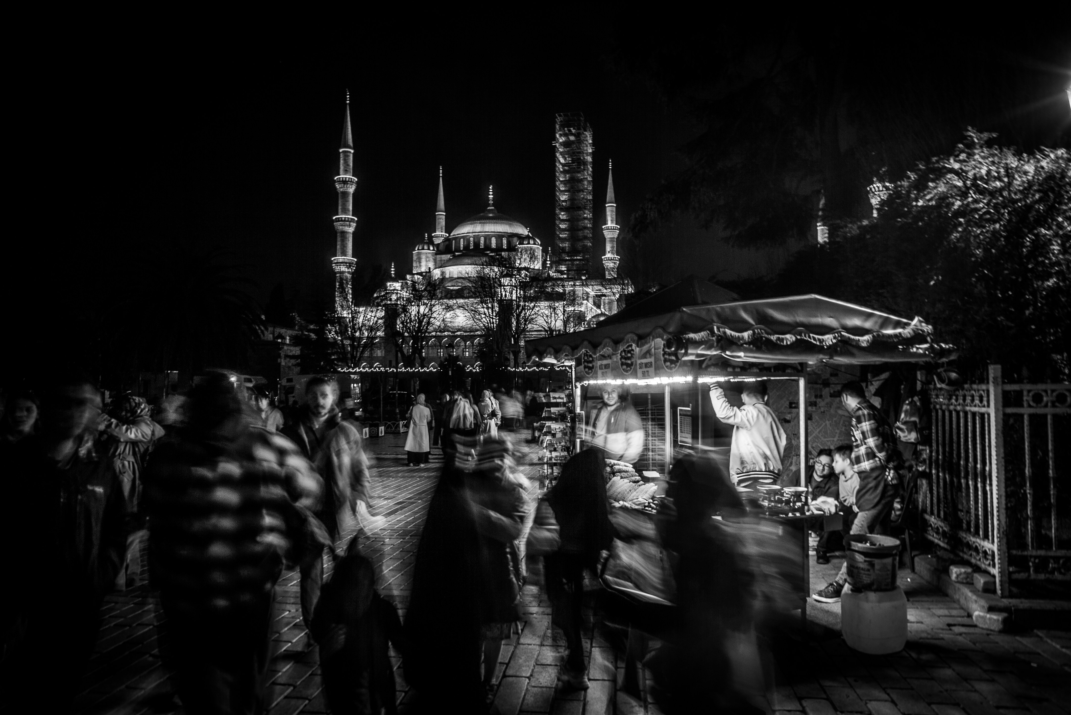 Nocturnal Bazaar Framed by Minarets: A Black-and-White Night Scene