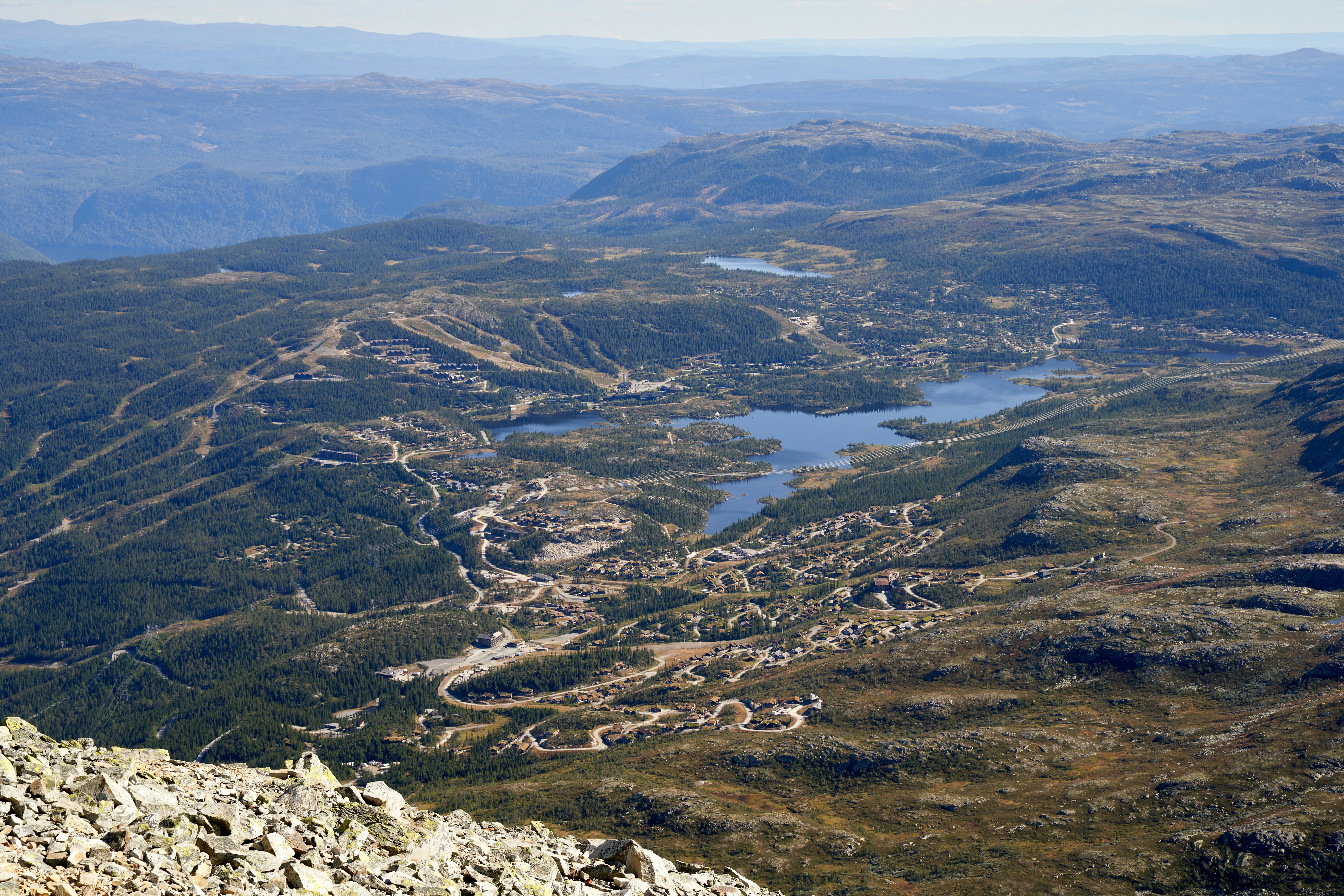 Terraced Hills and Serene Lakes in a Remote Highland Valley