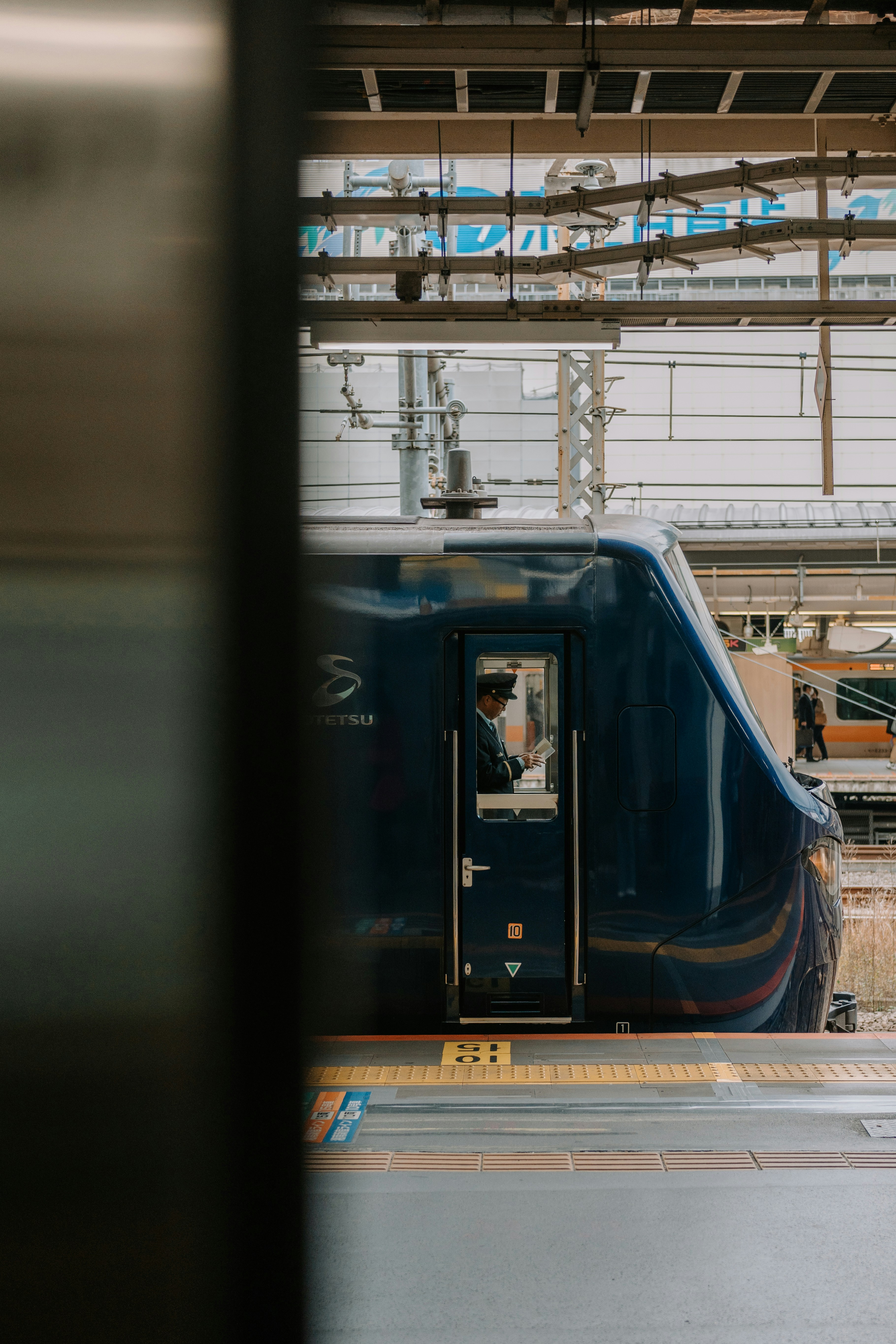 Train conductor in uniform at train station door photo – Free Travel ...