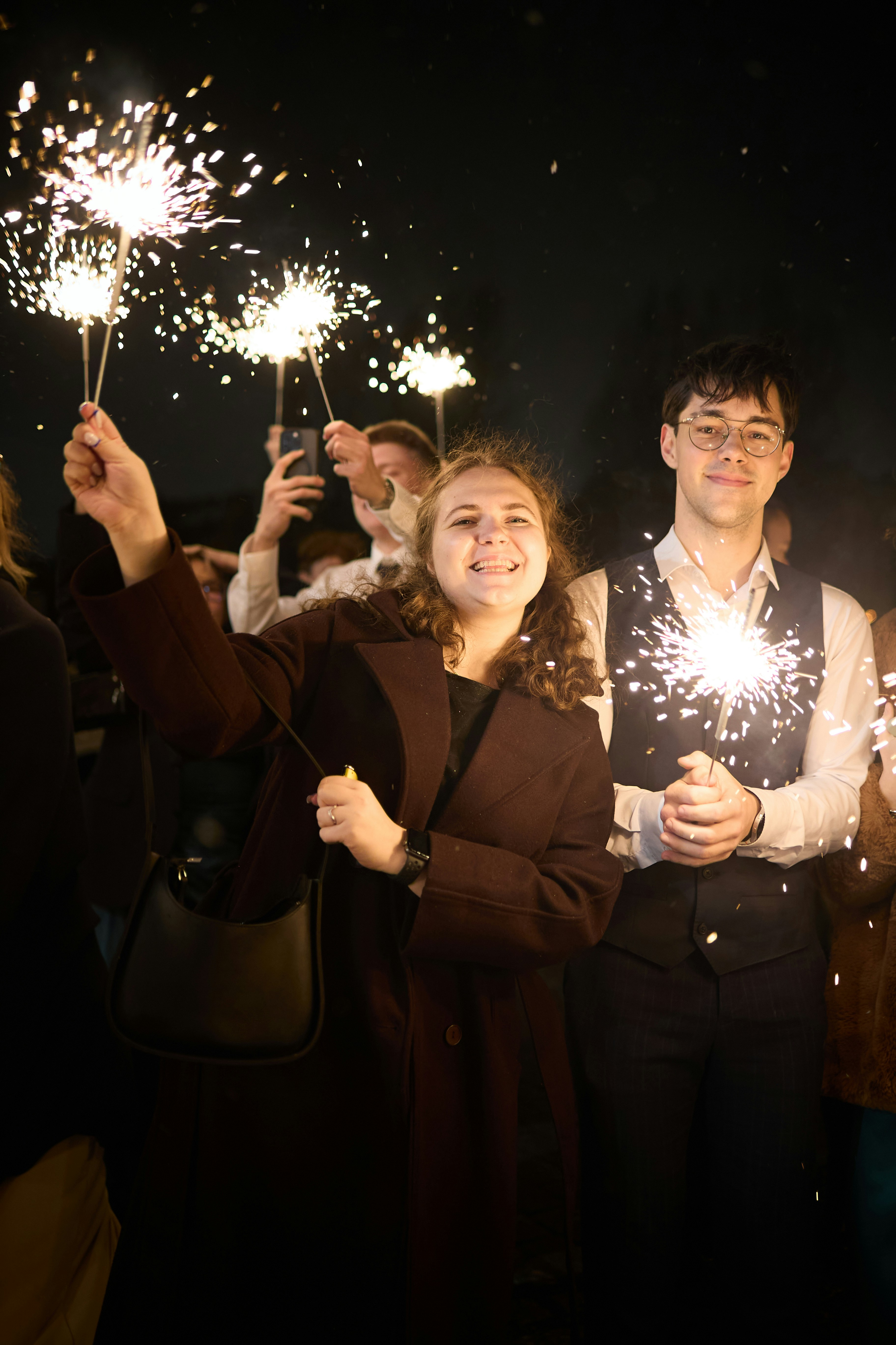Sparkler Night: Close-Up Joy Amid a Ring of Light