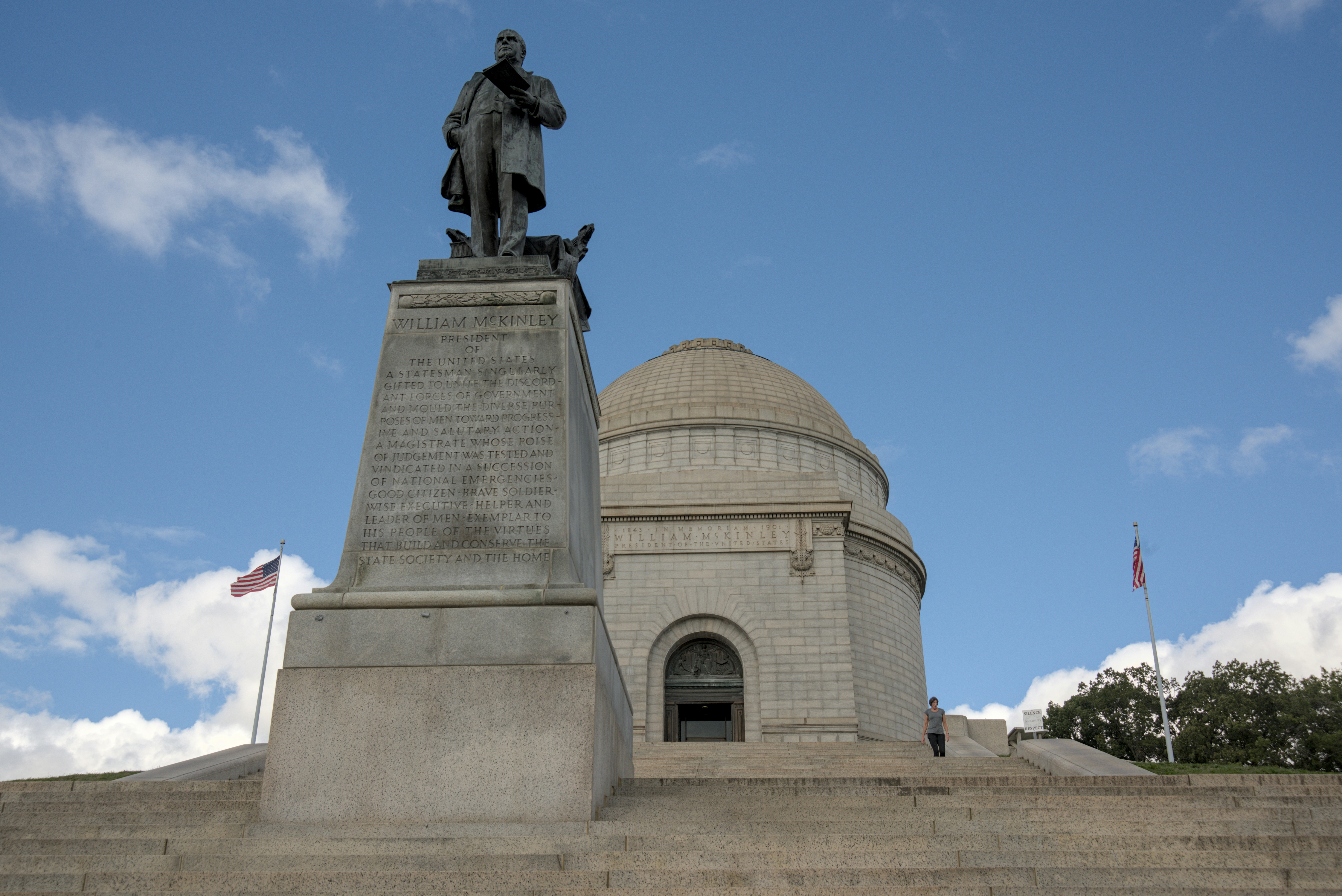 Stone Sentinel by the Rotunda under a Clear Sky