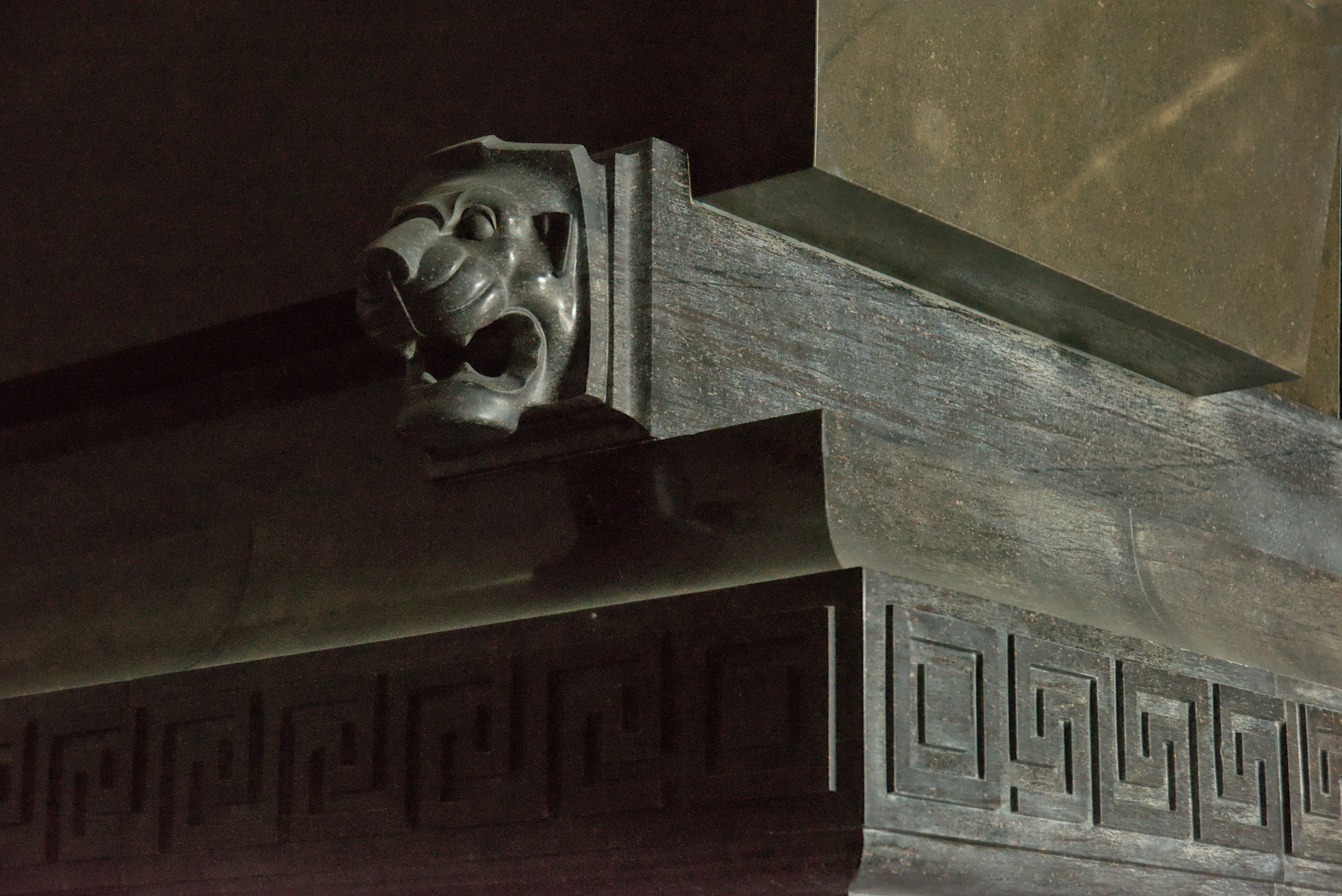 Lone Guardian Over a Dim Grecian Frieze