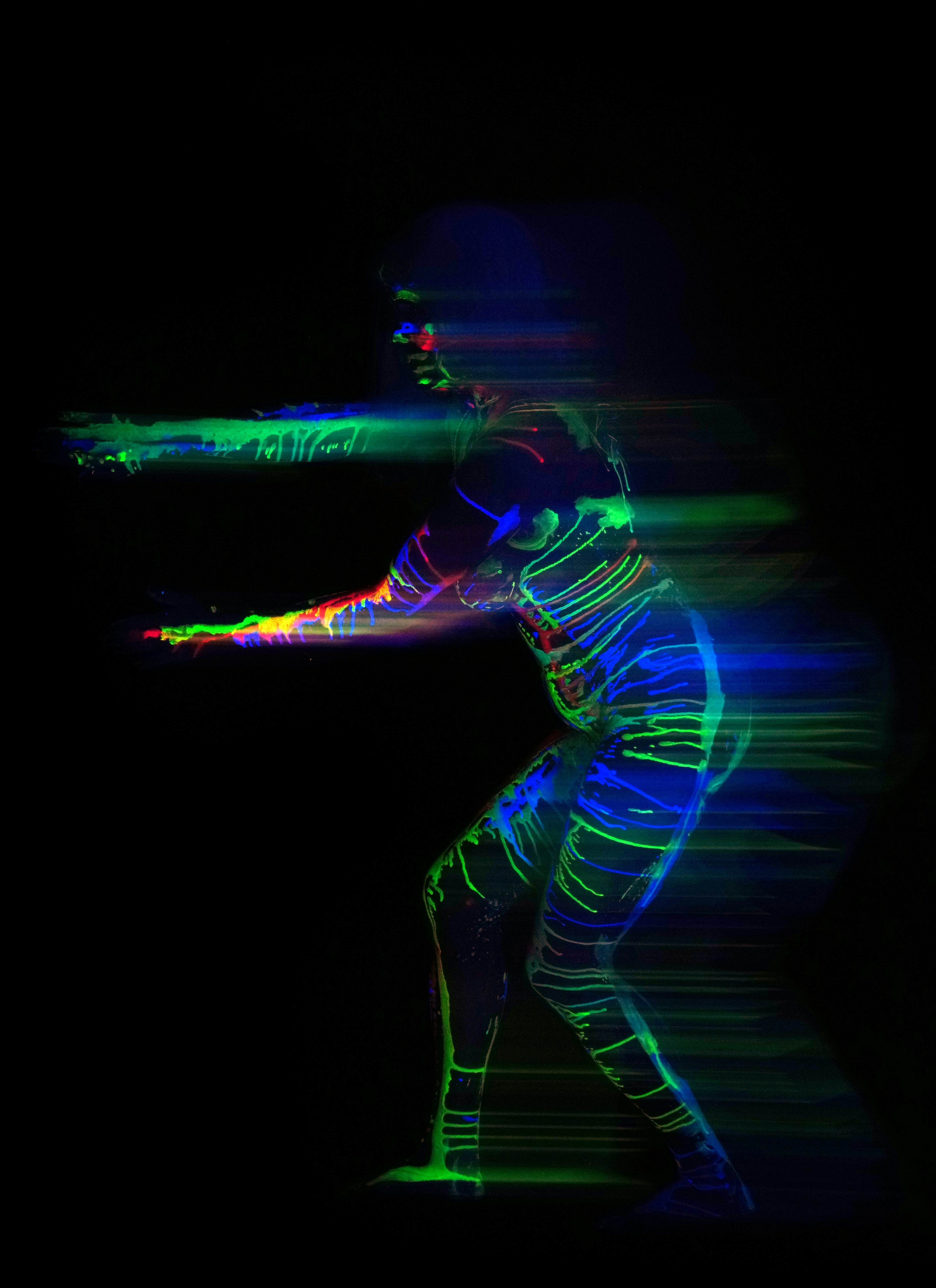 Neon Trails: Light-Painted Dancer in Midnight Motion