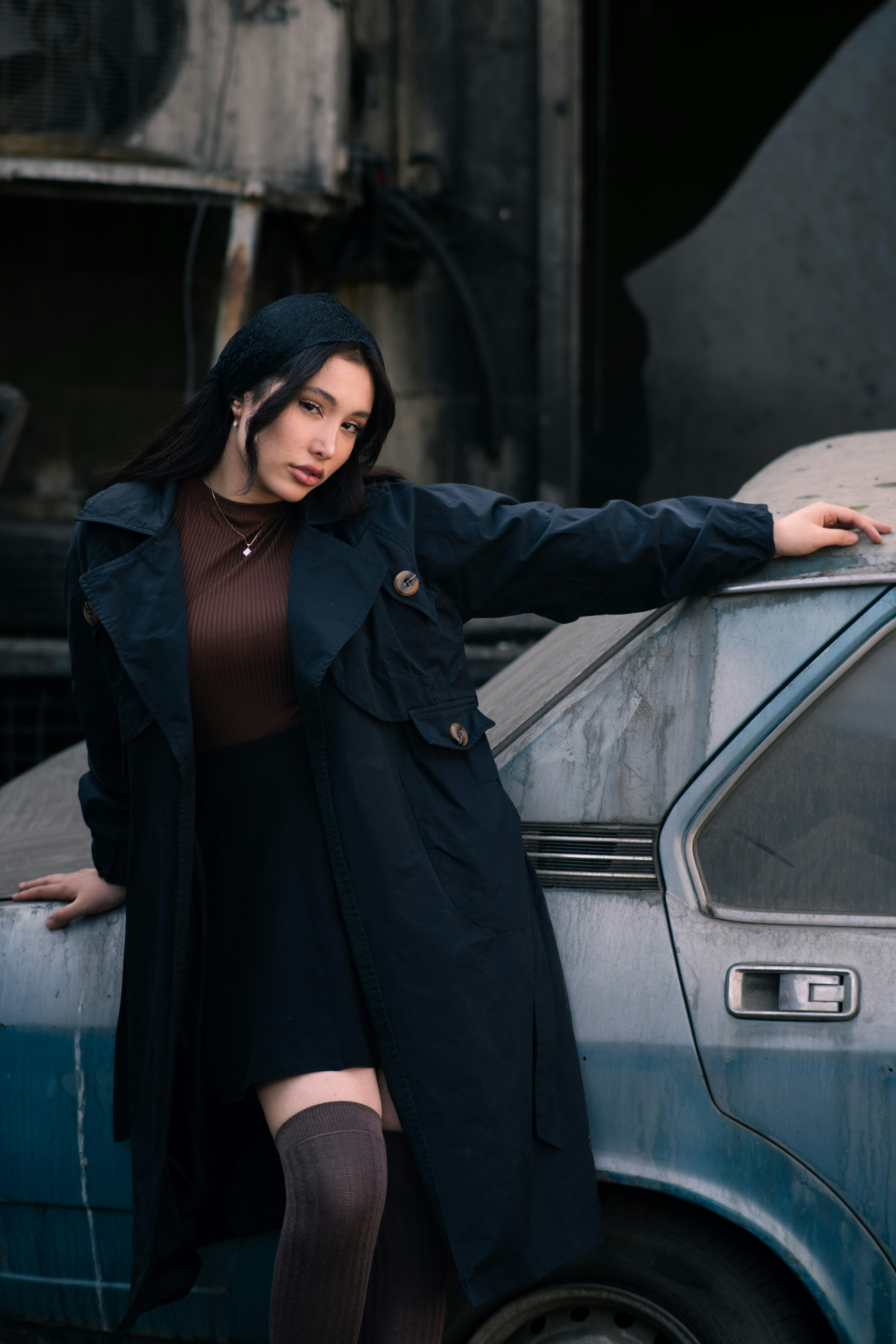 Edge of the Rusted Blue: A Quiet Street Portrait by a Weathered Car