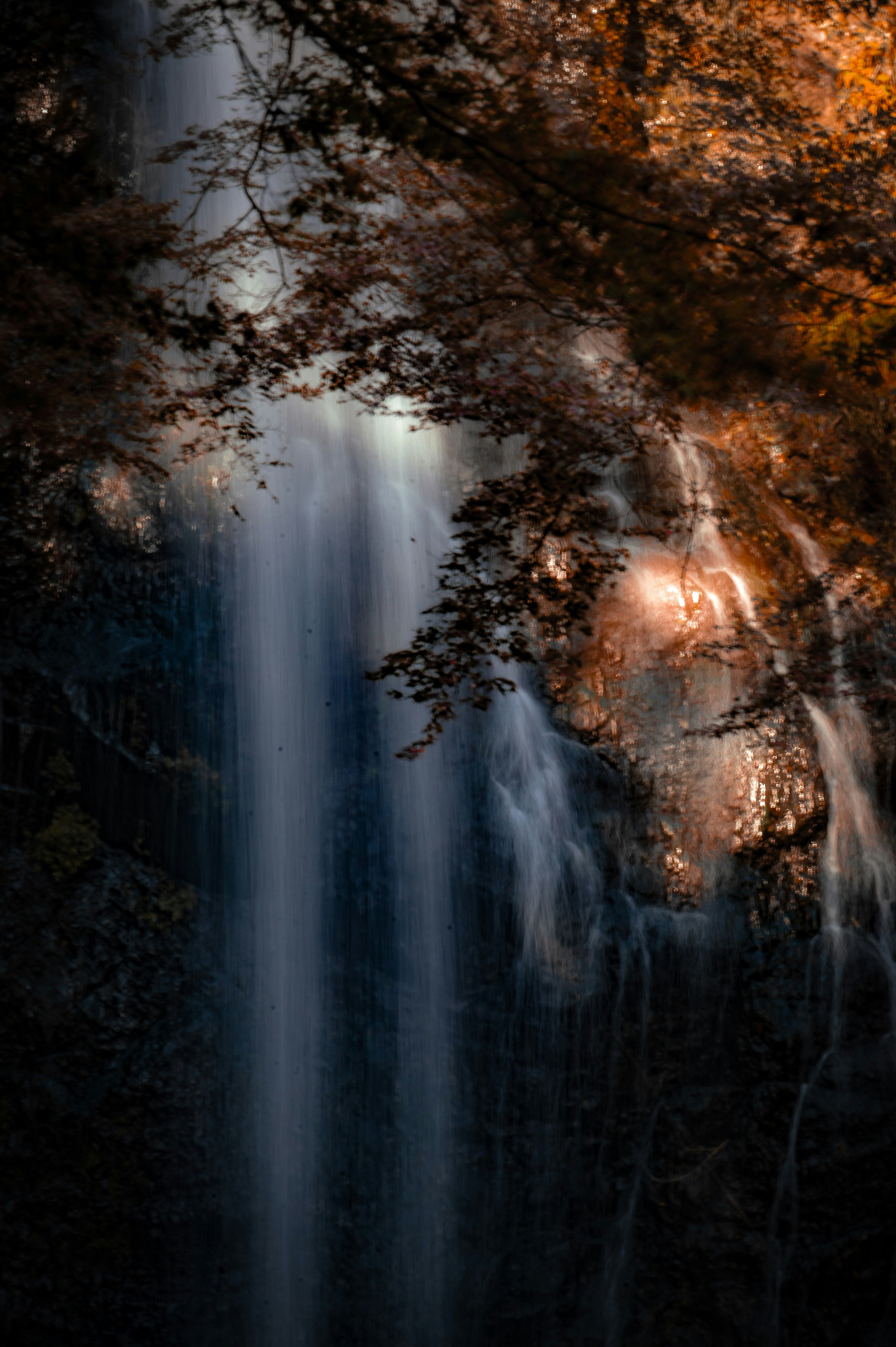 Twilight Veil: Autumn Light Fractures Across a Velvet Cascade