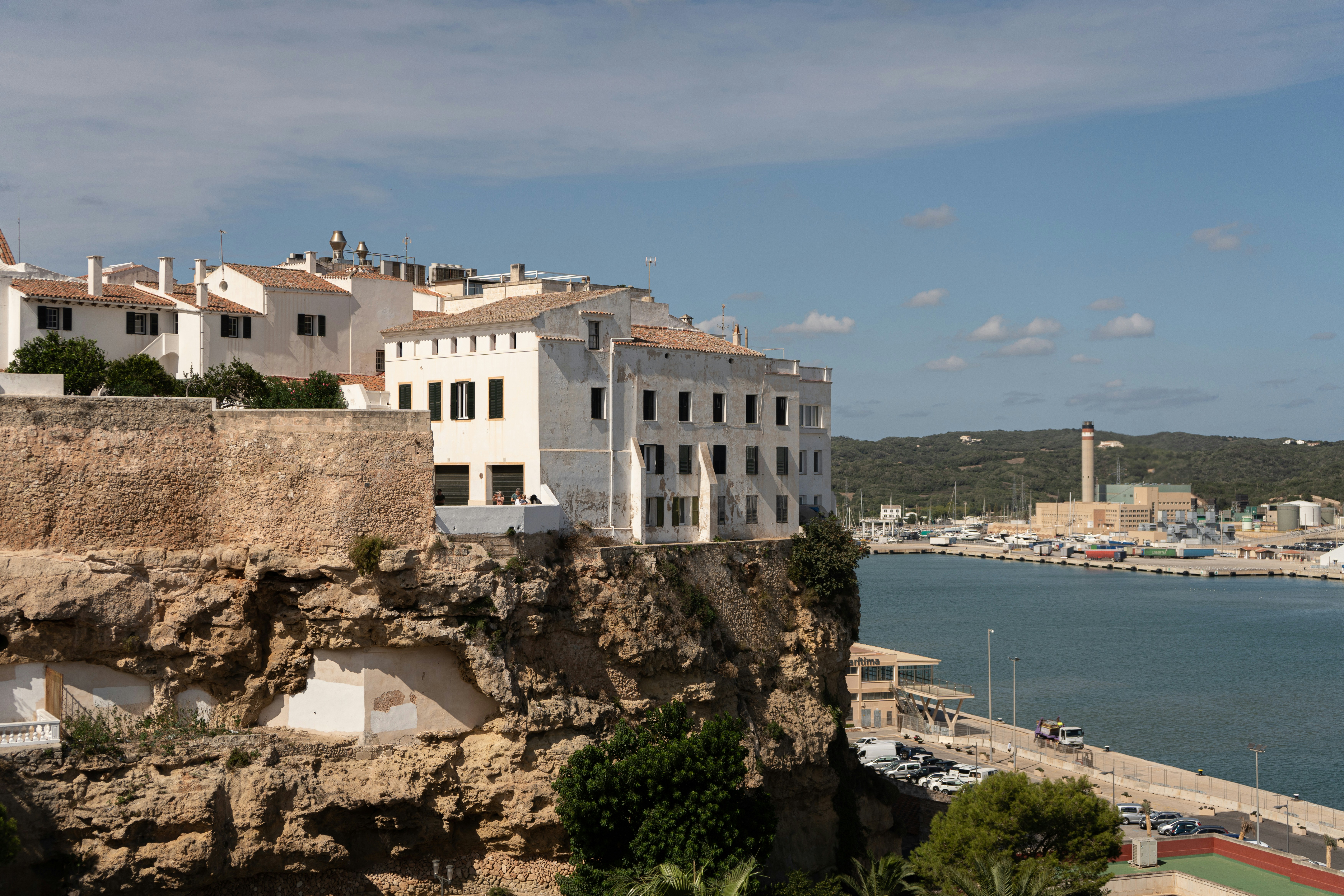 Ivory Clifftop Quarter Framing a Quiet Harbor