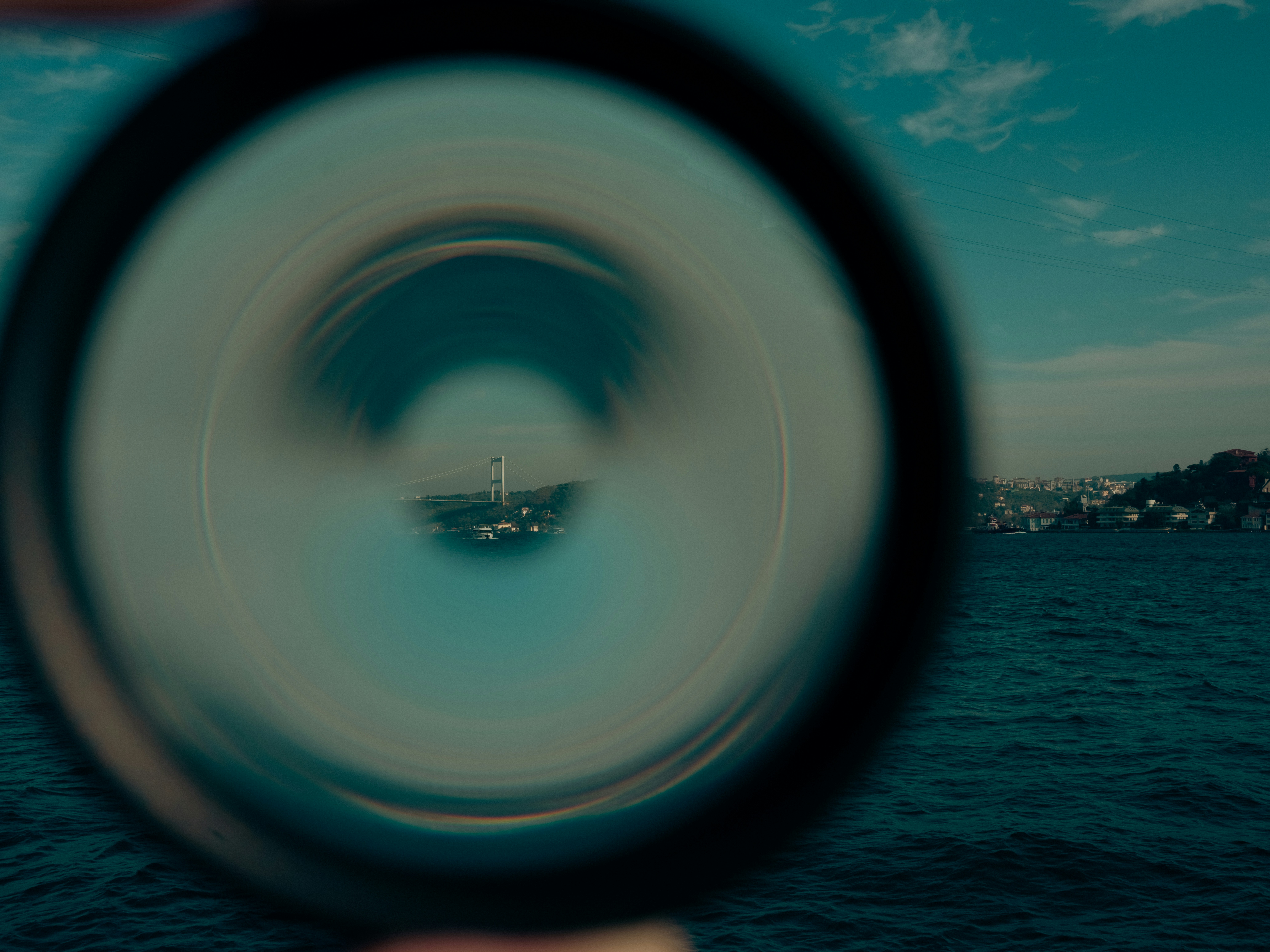 View through a lens of a distant city skyline. photo – Free Abstract ...