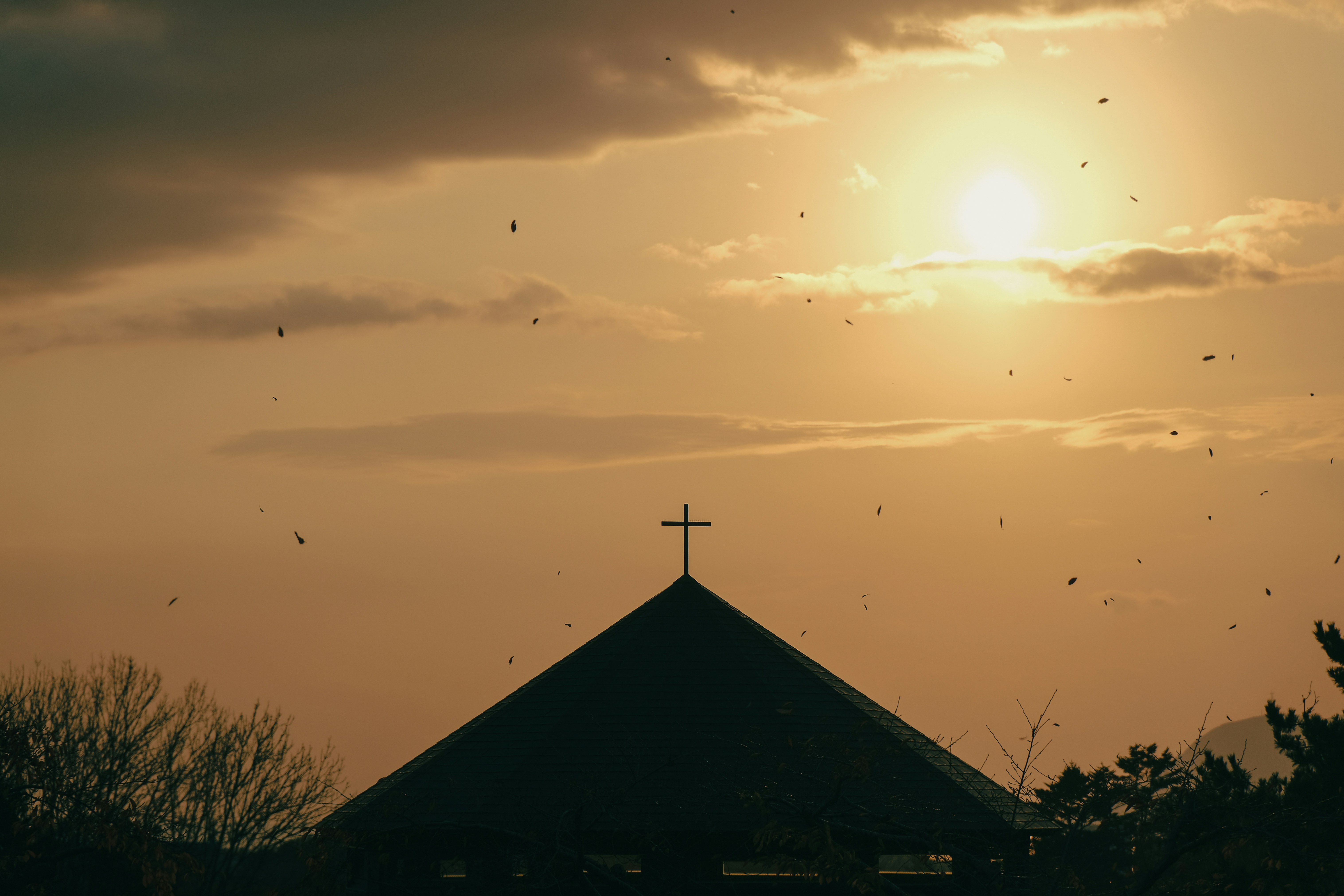 Dusk Crest: Cross atop a Chapel at Golden Hour