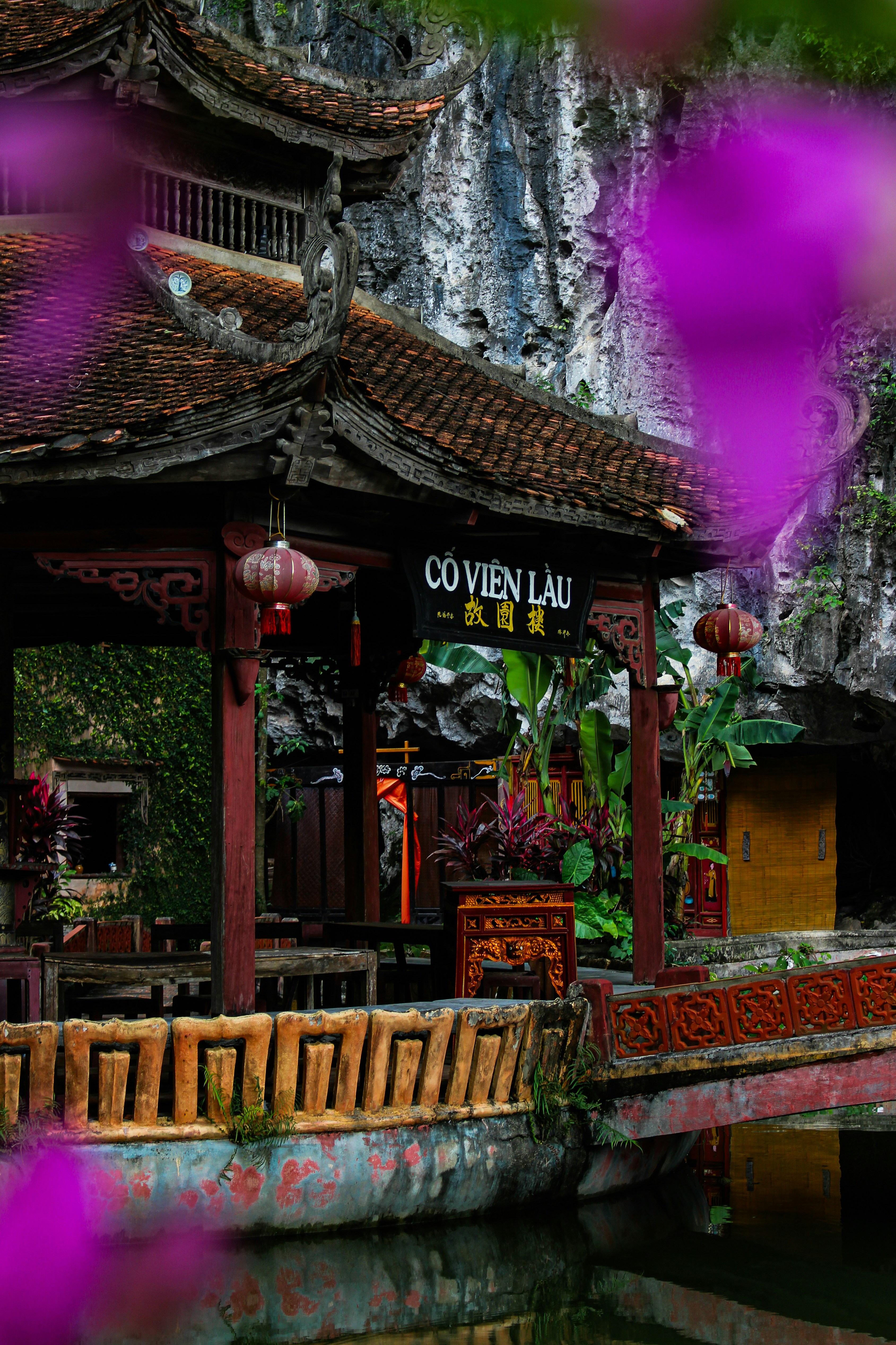 Cliffside Lanterns: A Temple Nestled Under Red Roofs