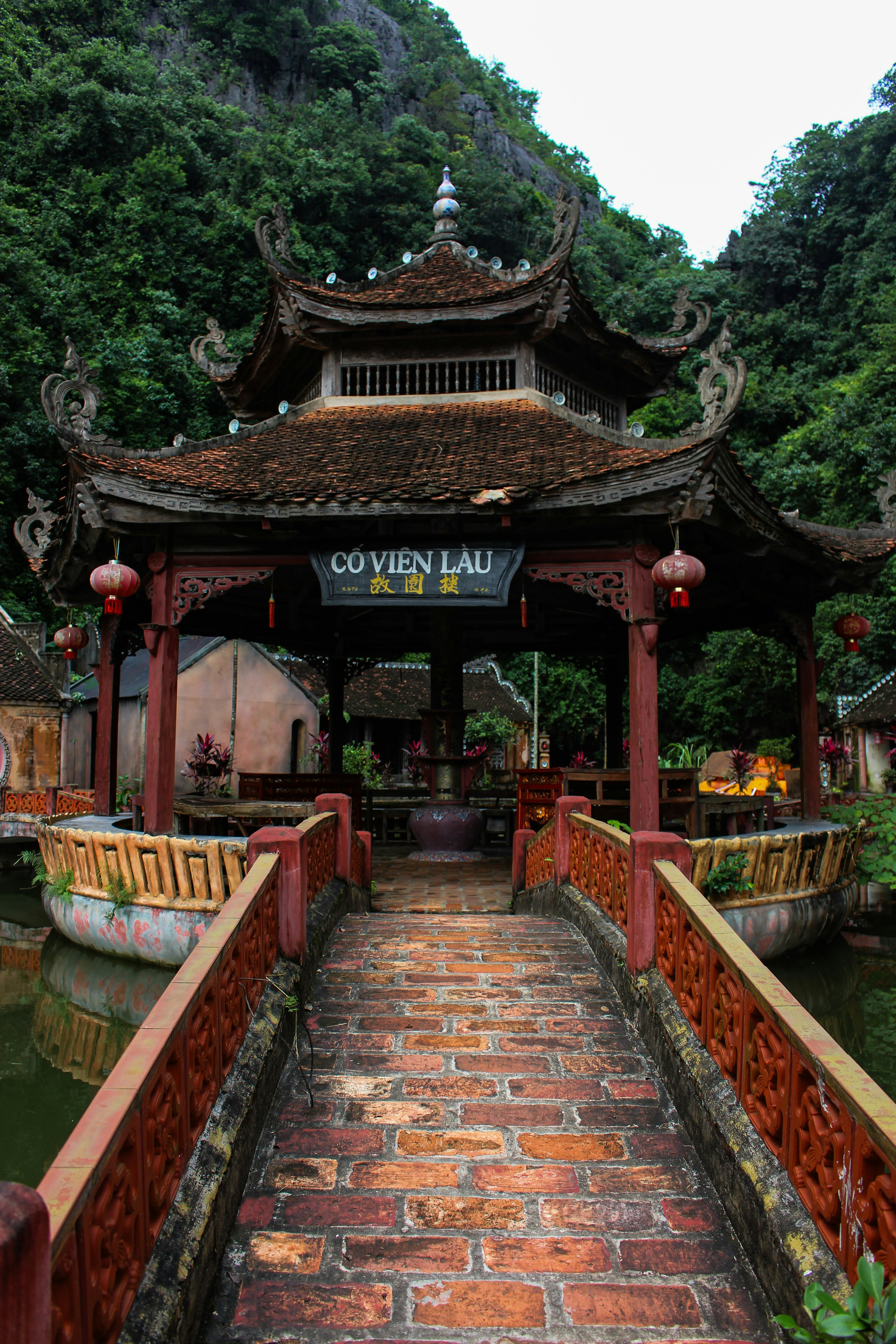 Brick Path to the Red Pavilion: A Quiet Mountain Temple in Verdant Surroundings