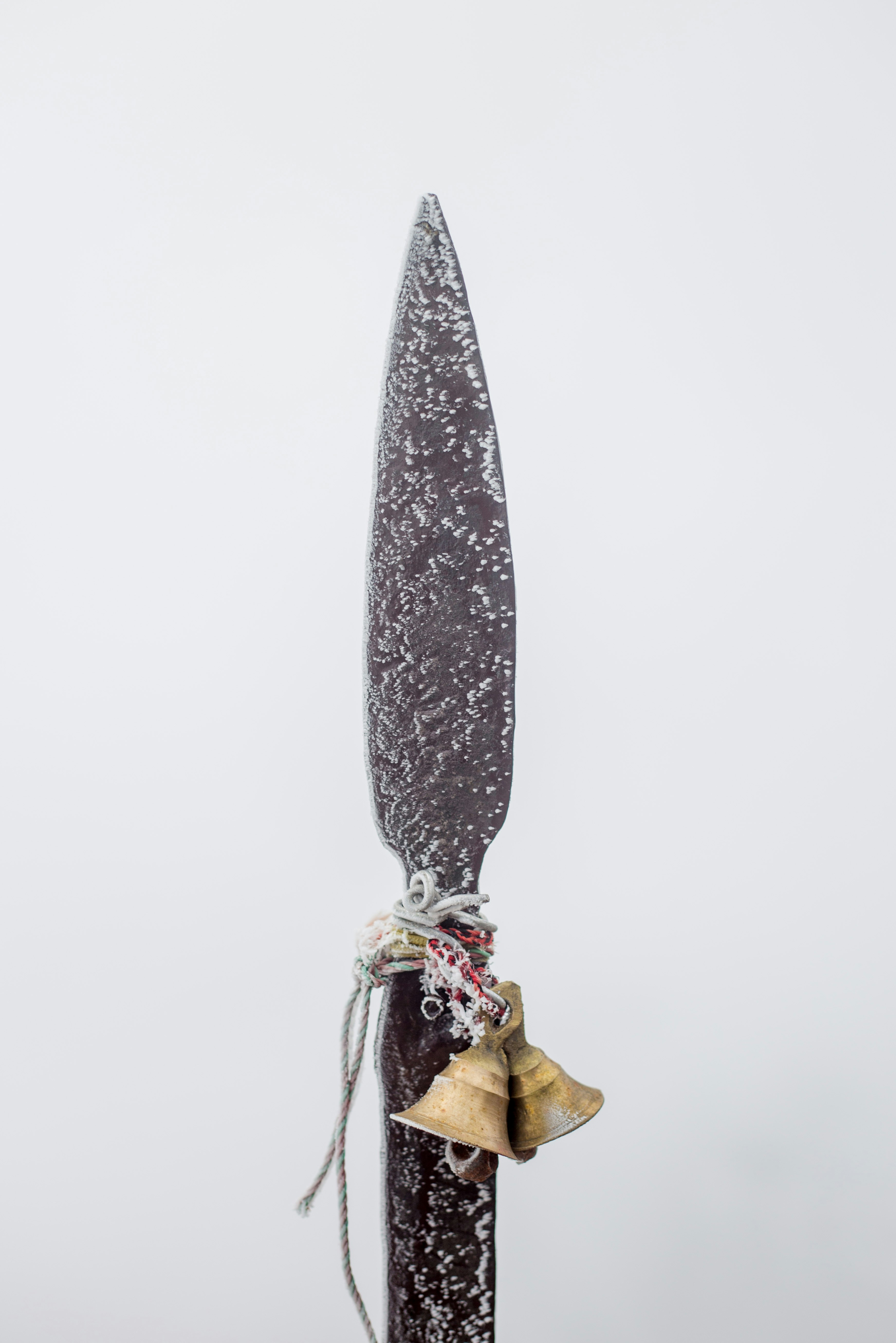 Icy Dagger Portrait: Frost-etched Blade with Bell Pendant