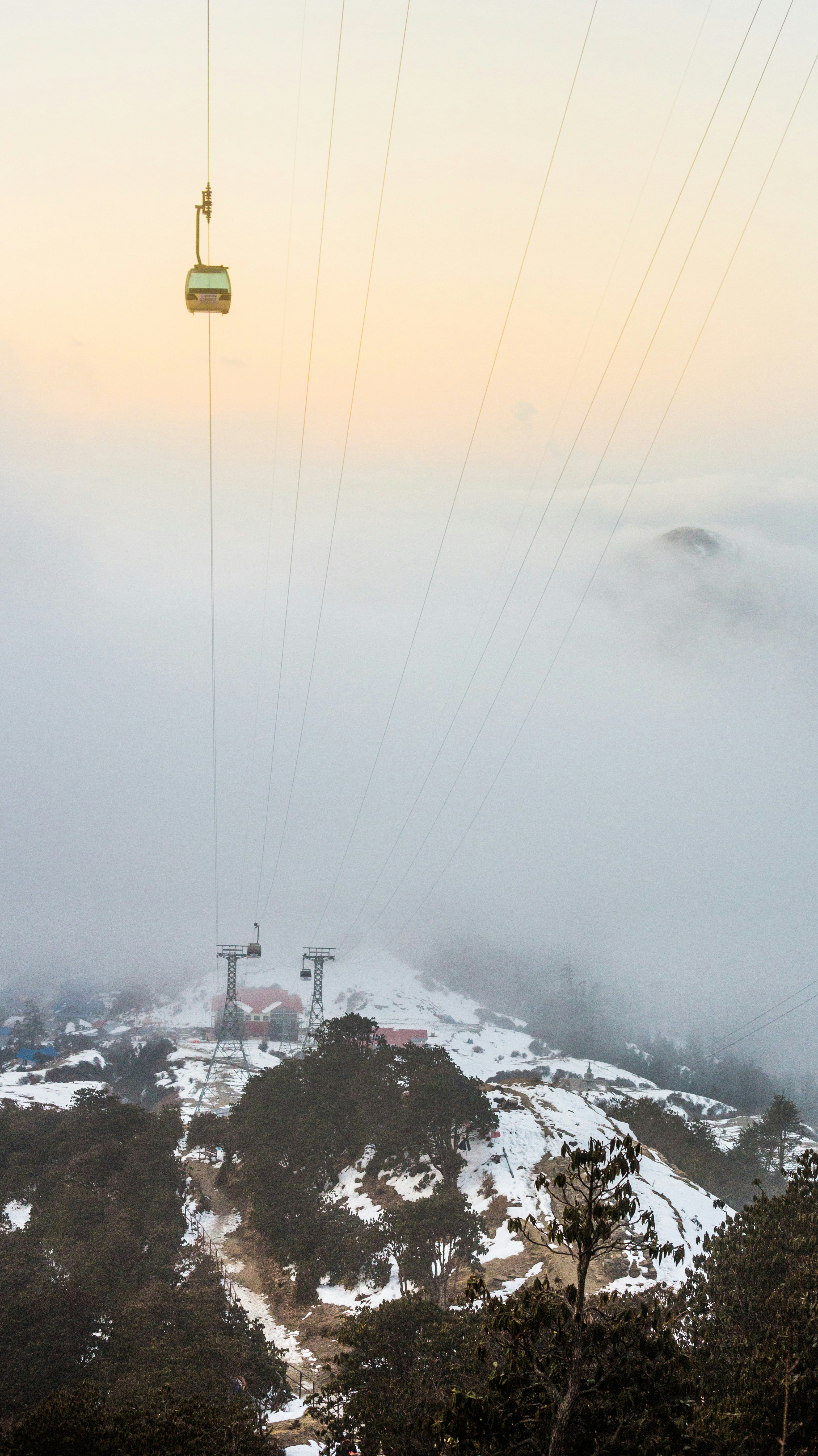 Snowy Kalinchowk Mountain with Cable Car Gliding Through Winter Landscape