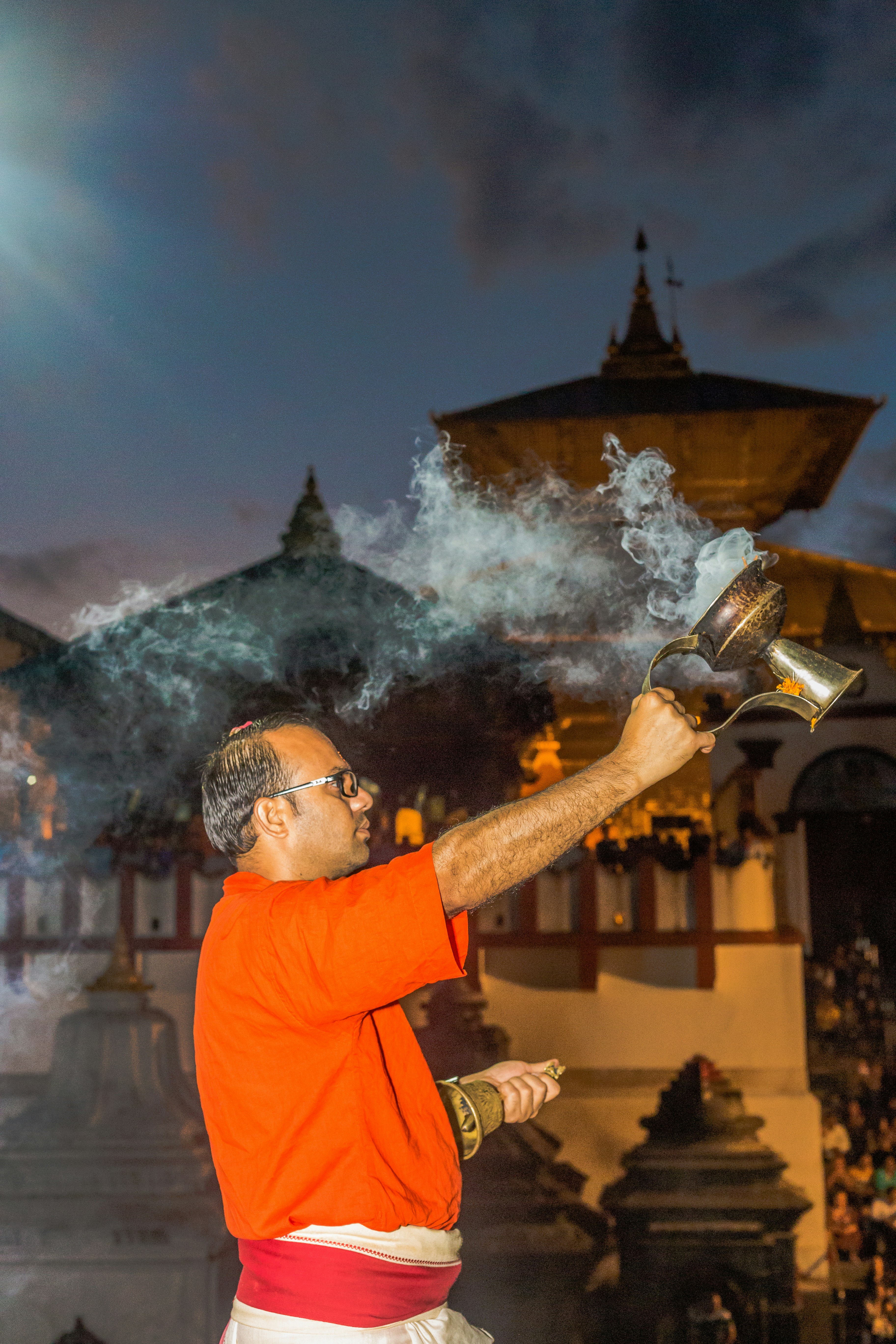 Kettle of Smoke under Temple Lights: Night Ritual with a Pouring Bronze Vessel