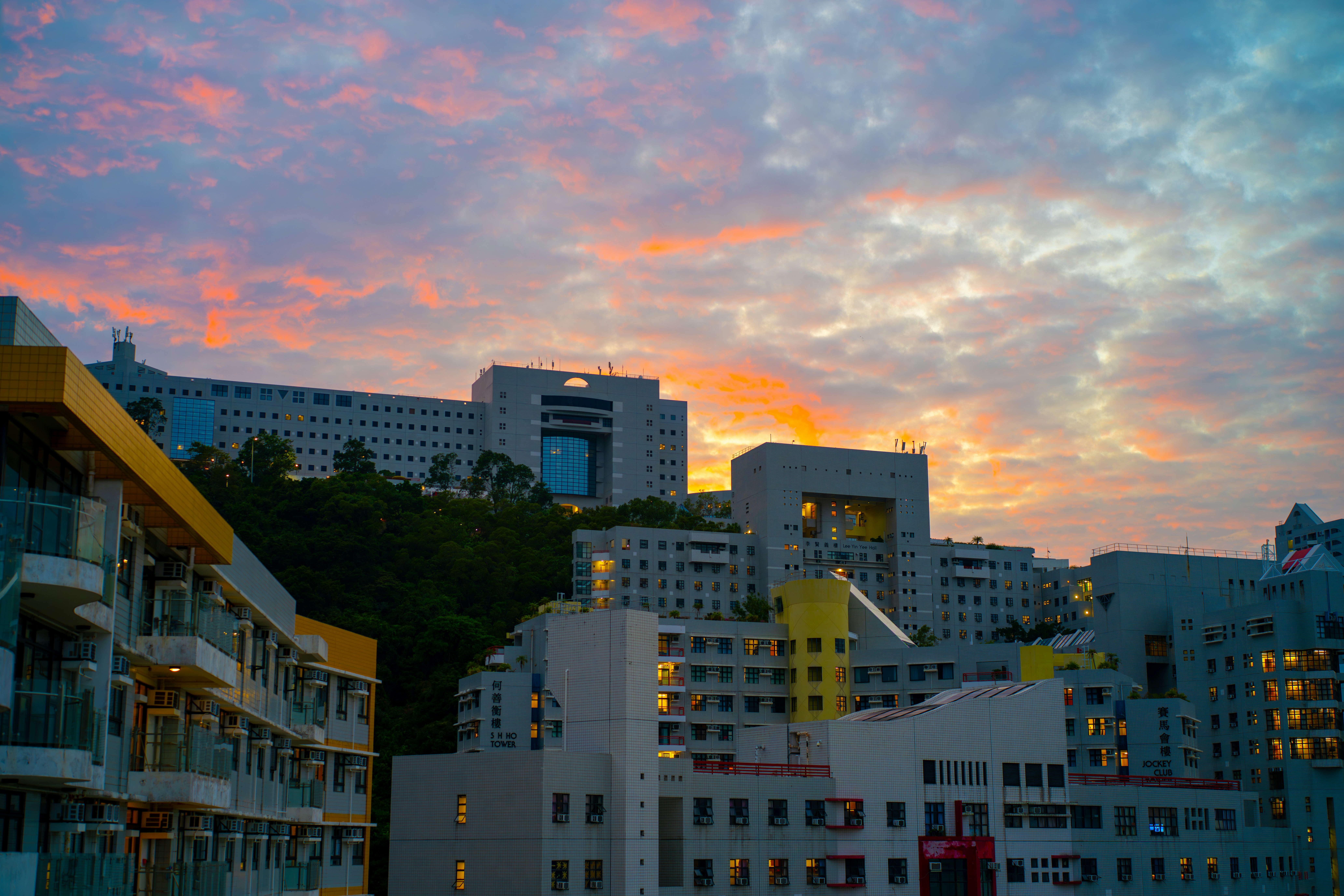 Crimson Sky Over a Maze of White Balconies