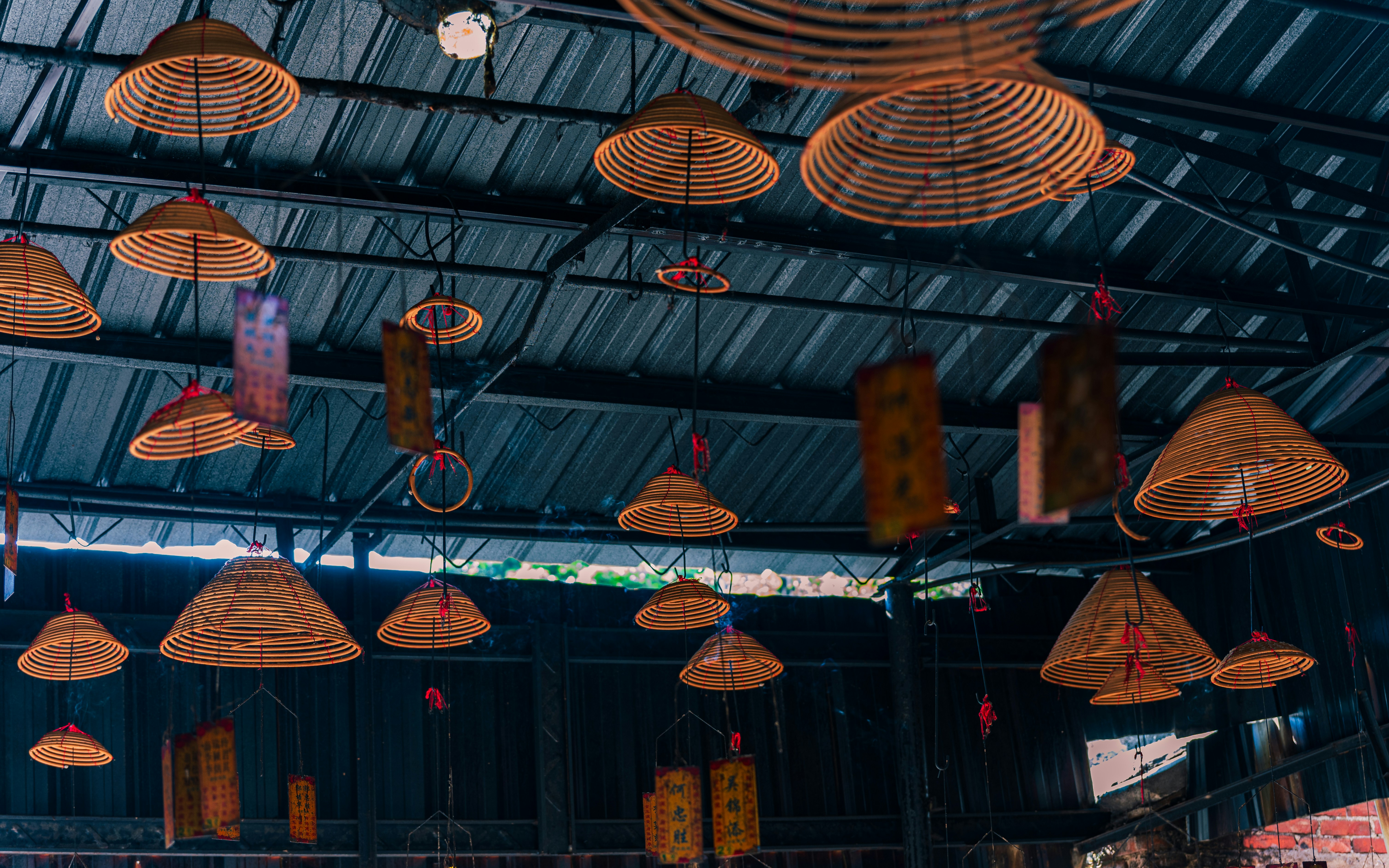 Orbital Lanterns Hover Over a Corrugated Ceiling