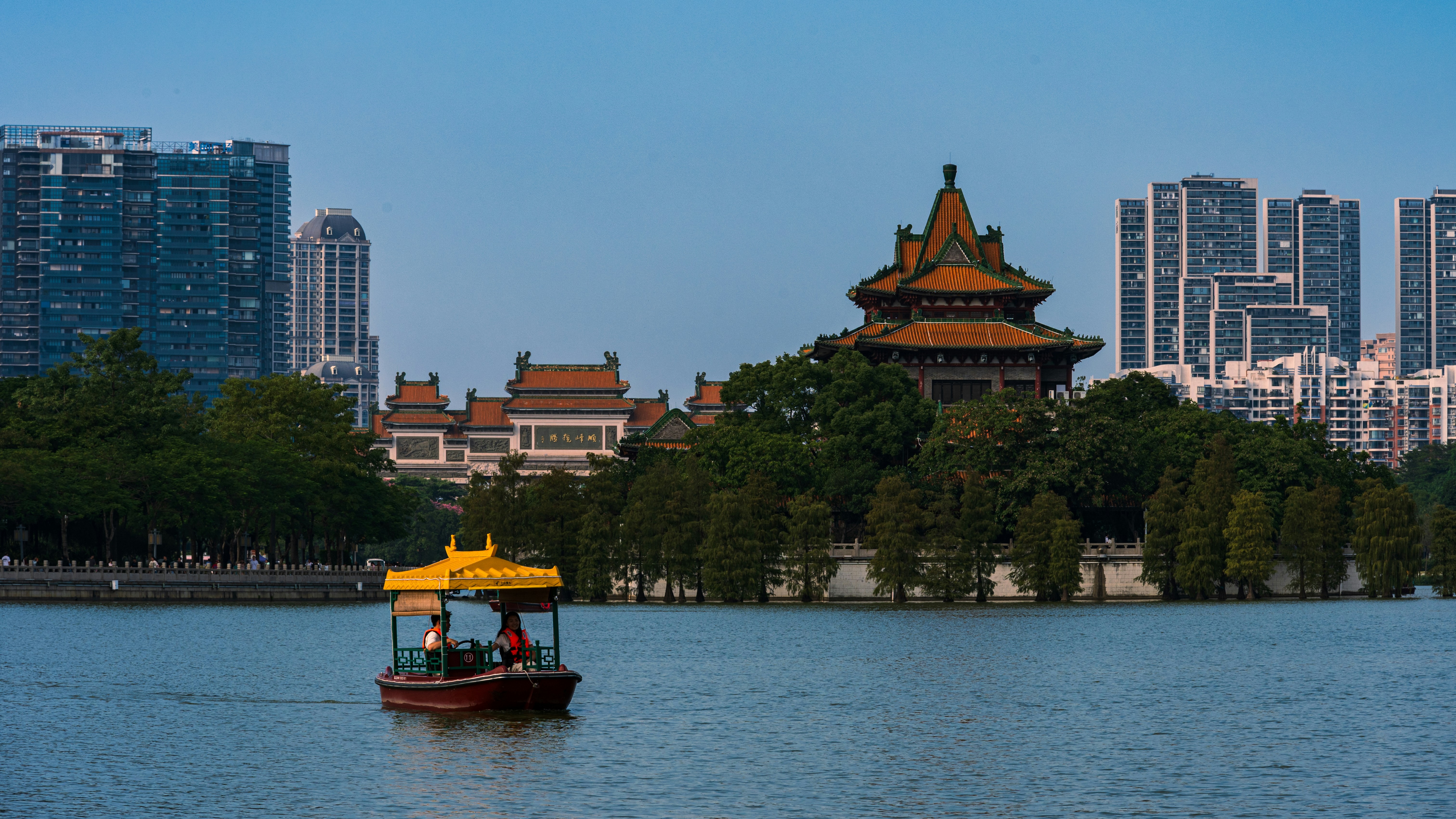 Golden Canopy on a Lake: When Pagoda Meets the City