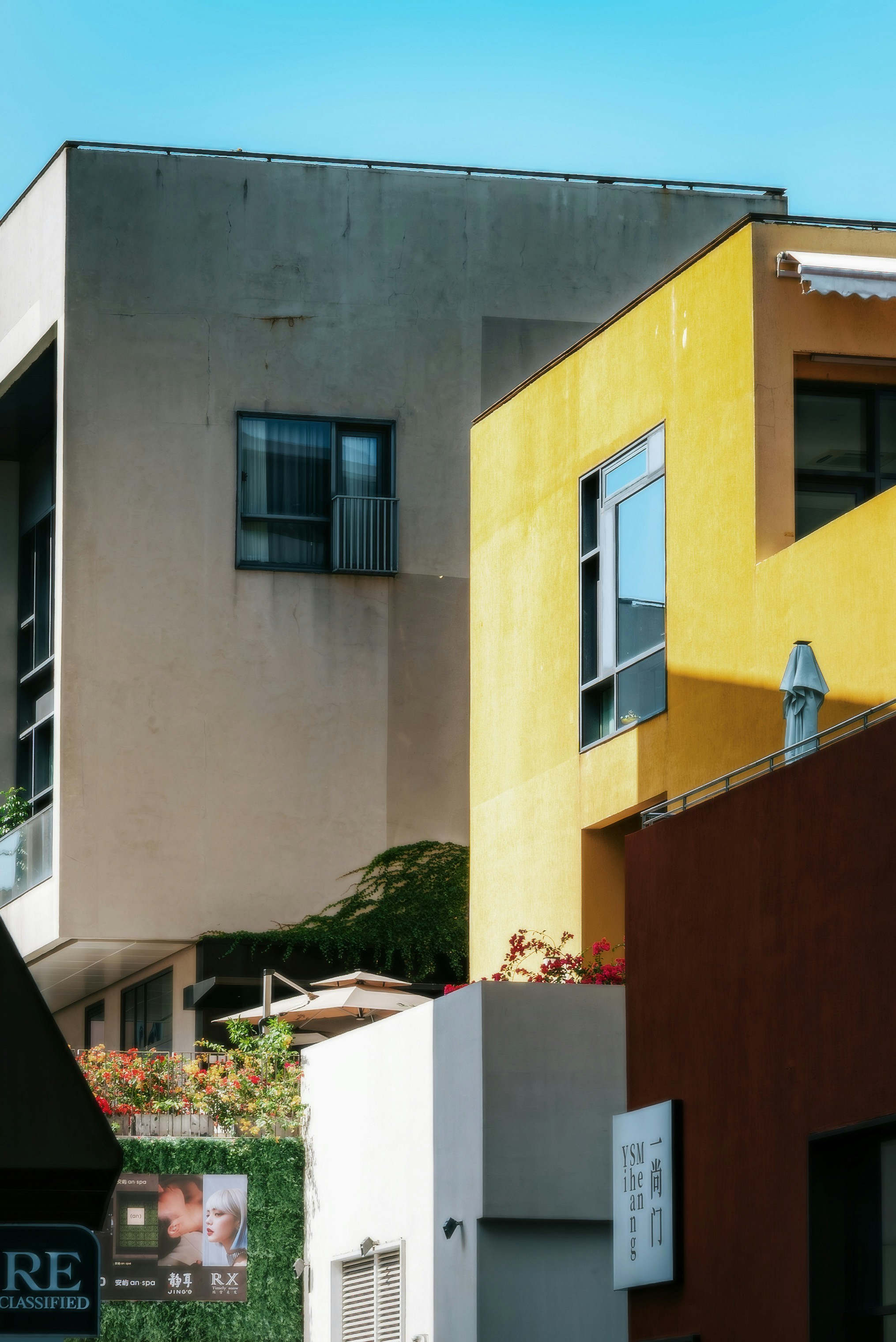 Modern buildings with vibrant yellow and brown facades. photo – Free ...
